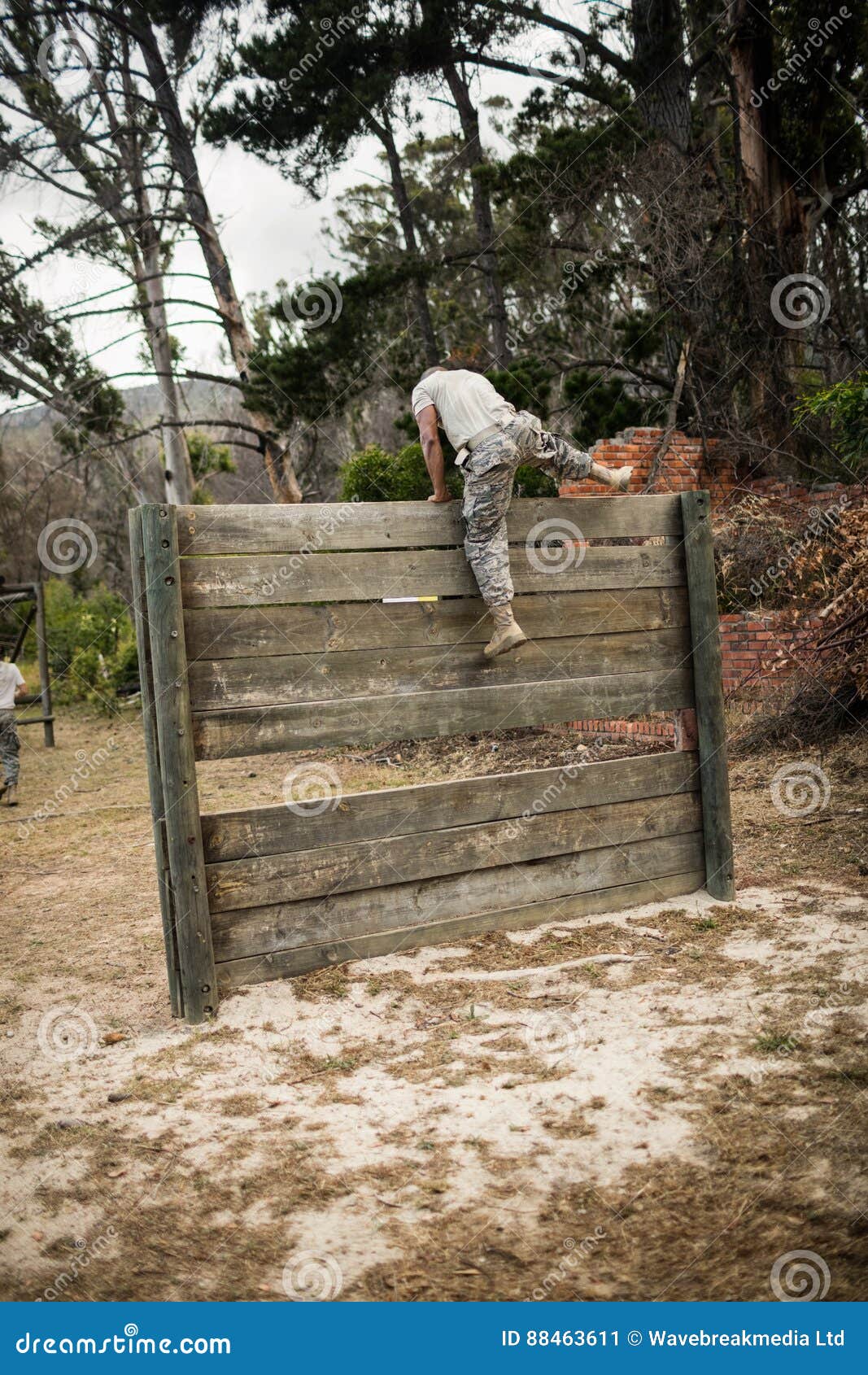 Soldier Climbing Wooden Wall in Boot Camp Stock Image - Image of ...
