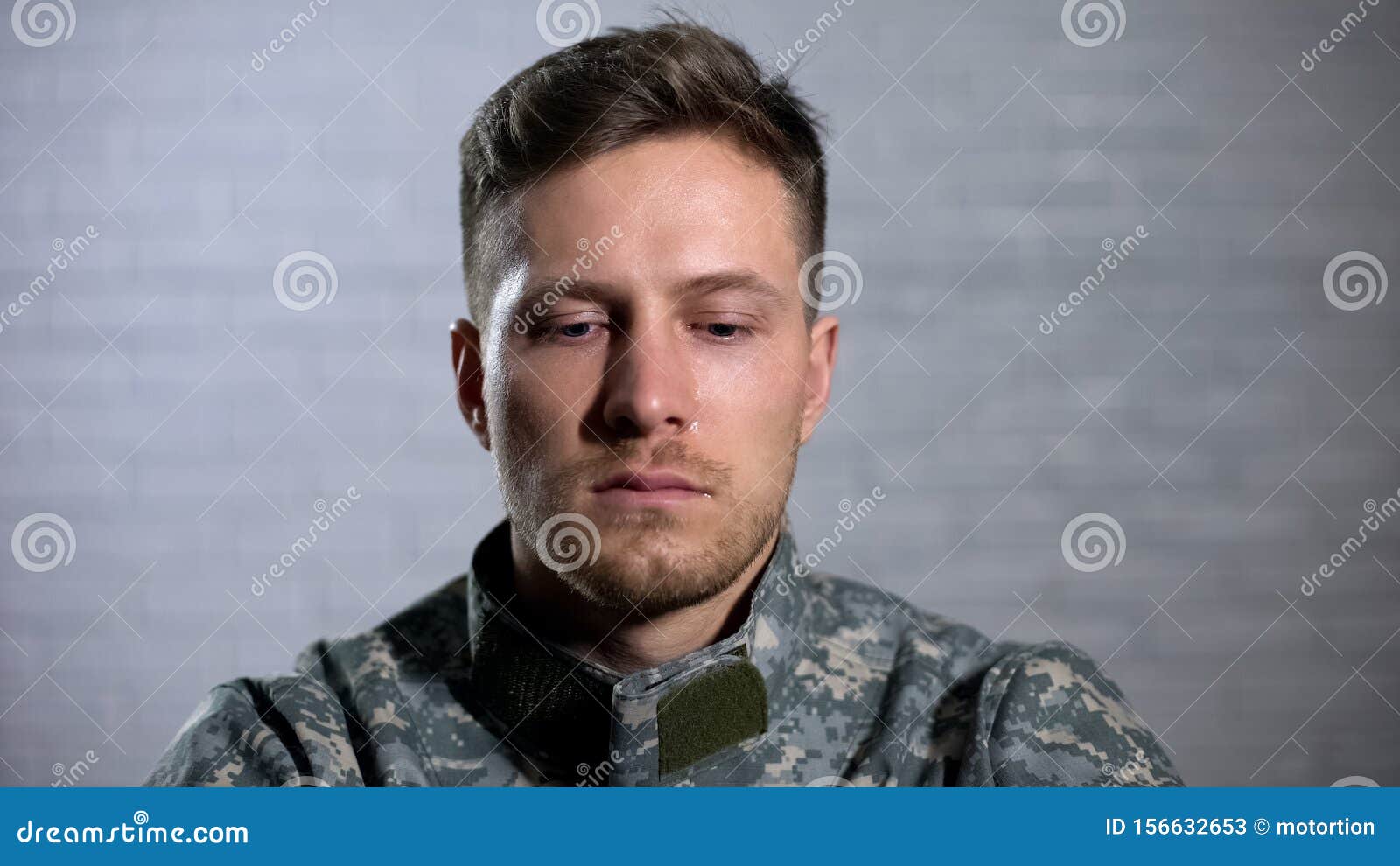 Soldier Crying and Looking Down, Remembering Dead Fellows and Feeling ...