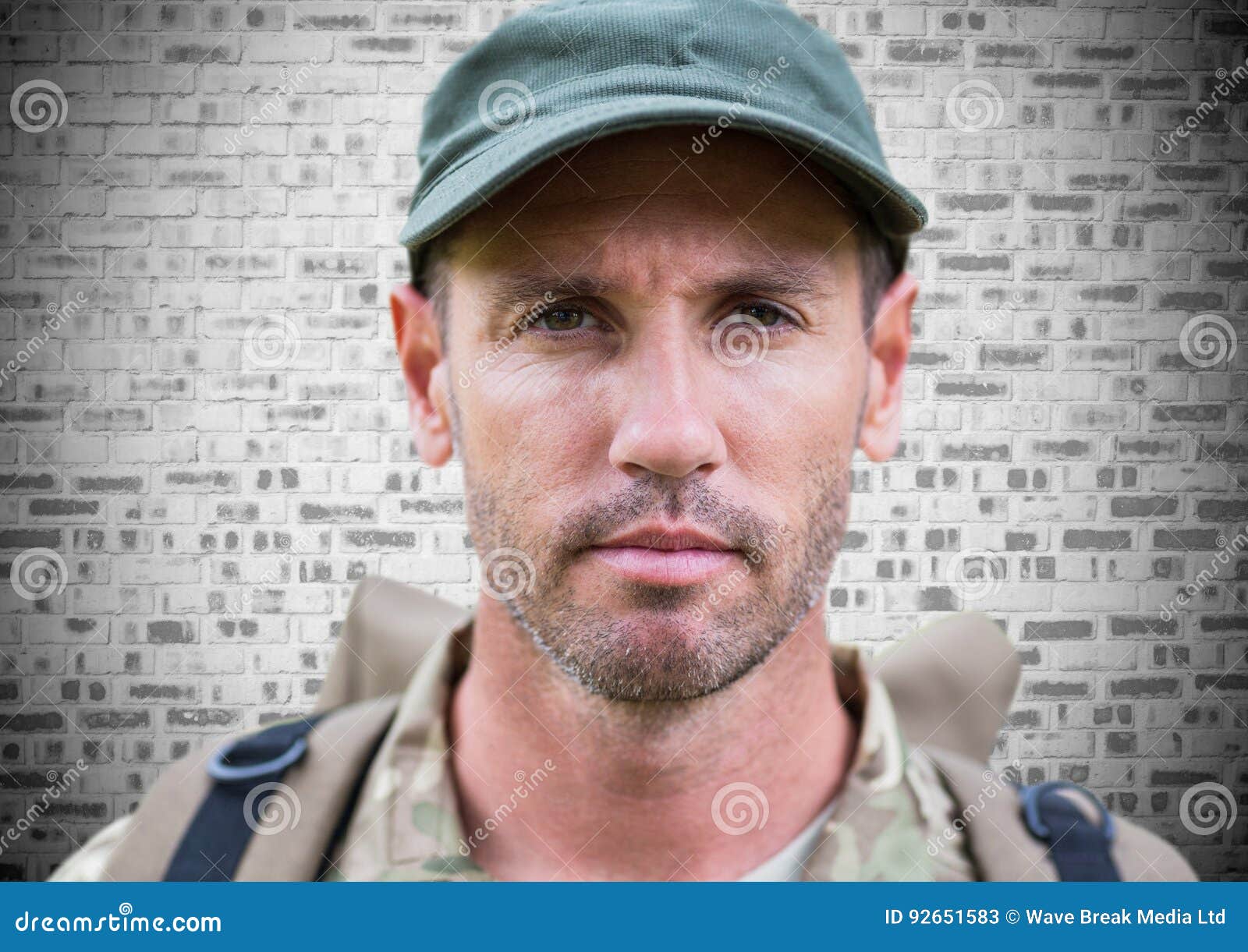 Soldier Face with Grunge Overlay Against Brick Wall Stock Image - Image ...