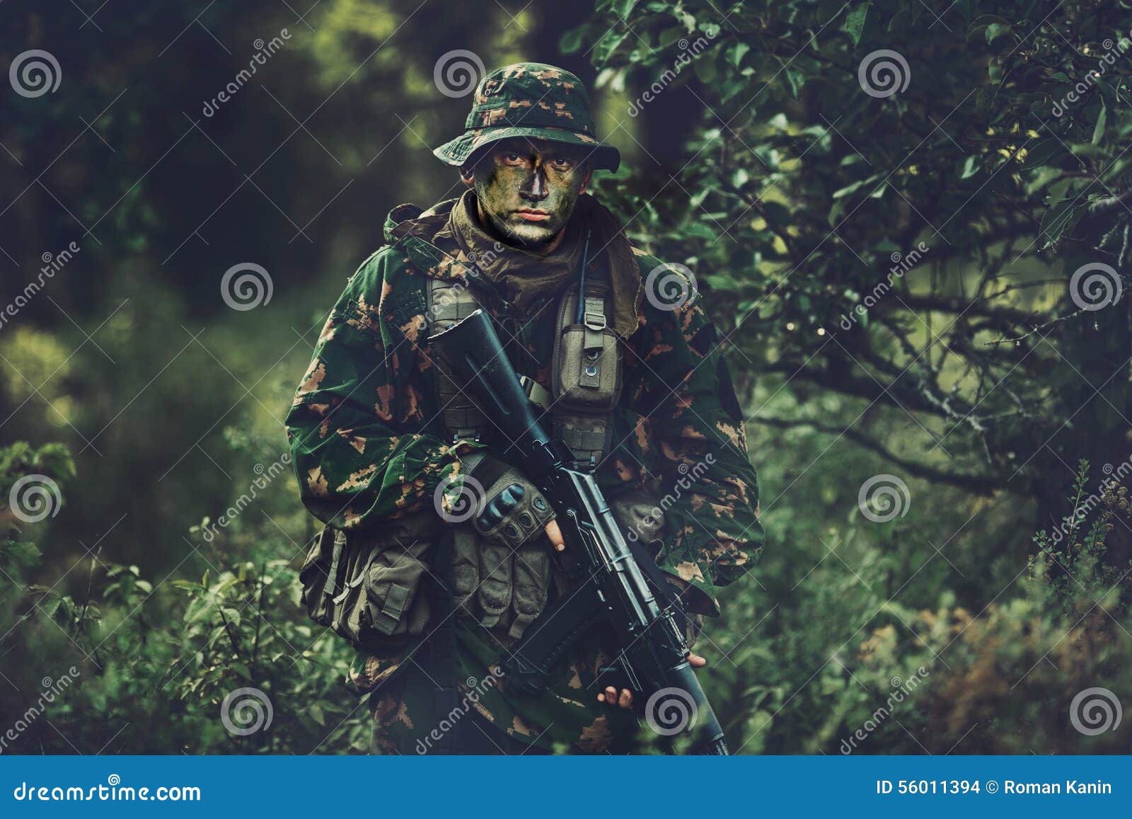 Soldier in Forest Area at Twilight Stock Photo - Image of hidden, male ...