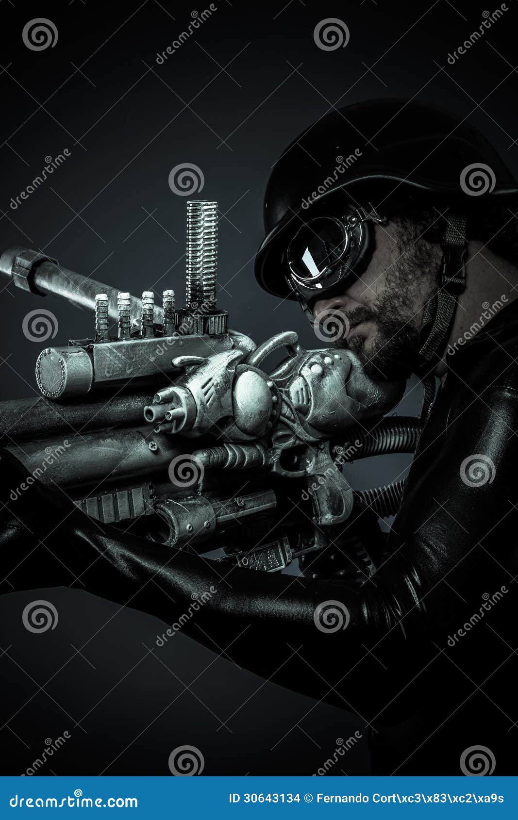 Soldier Of The Future With Huge Laser Gun And Cannon, Pointing Stock ...