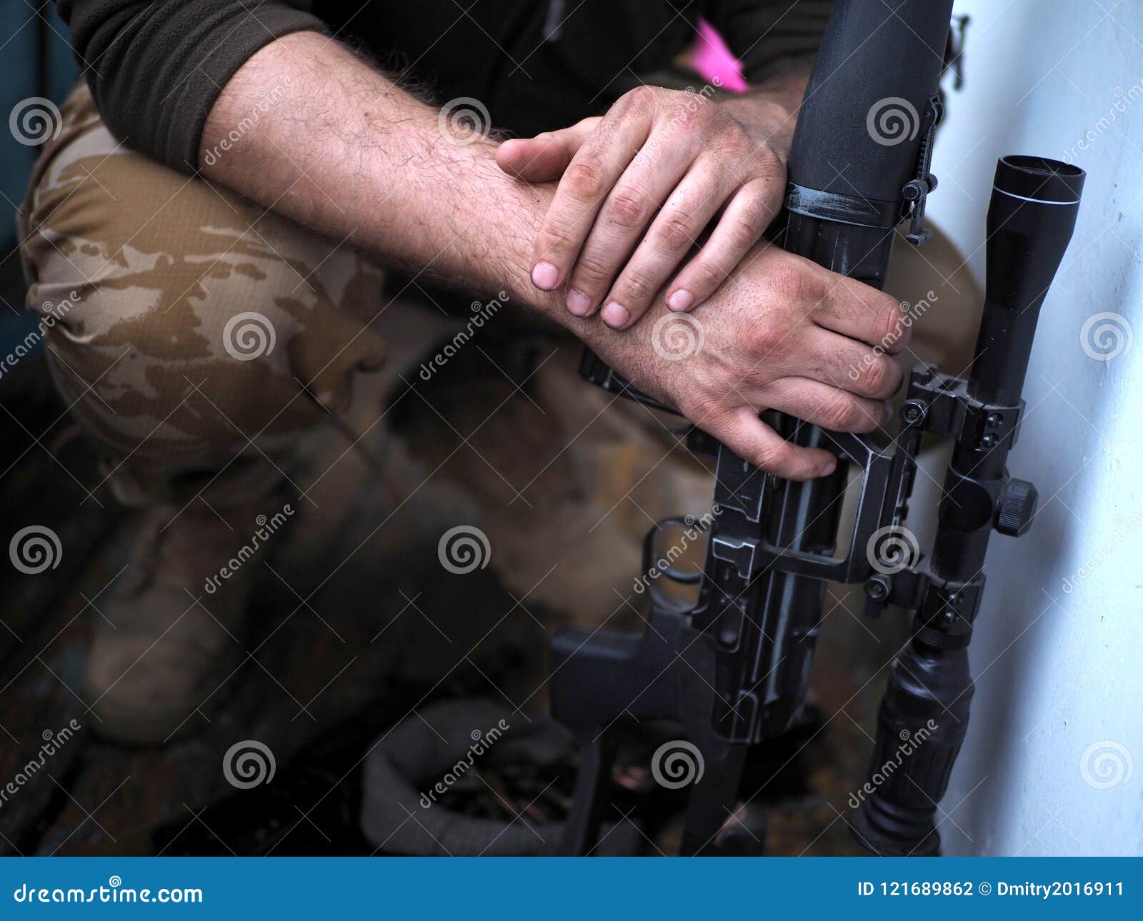 Soldier Hands And AK Rifle On The Floor. Sniper Rifle. Royalty-Free ...