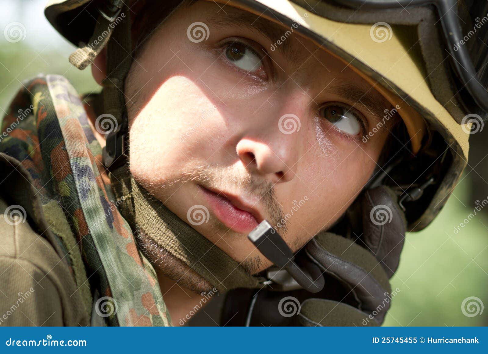 Soldier in Helmet Talking on a Headset Stock Image - Image of outdoors ...