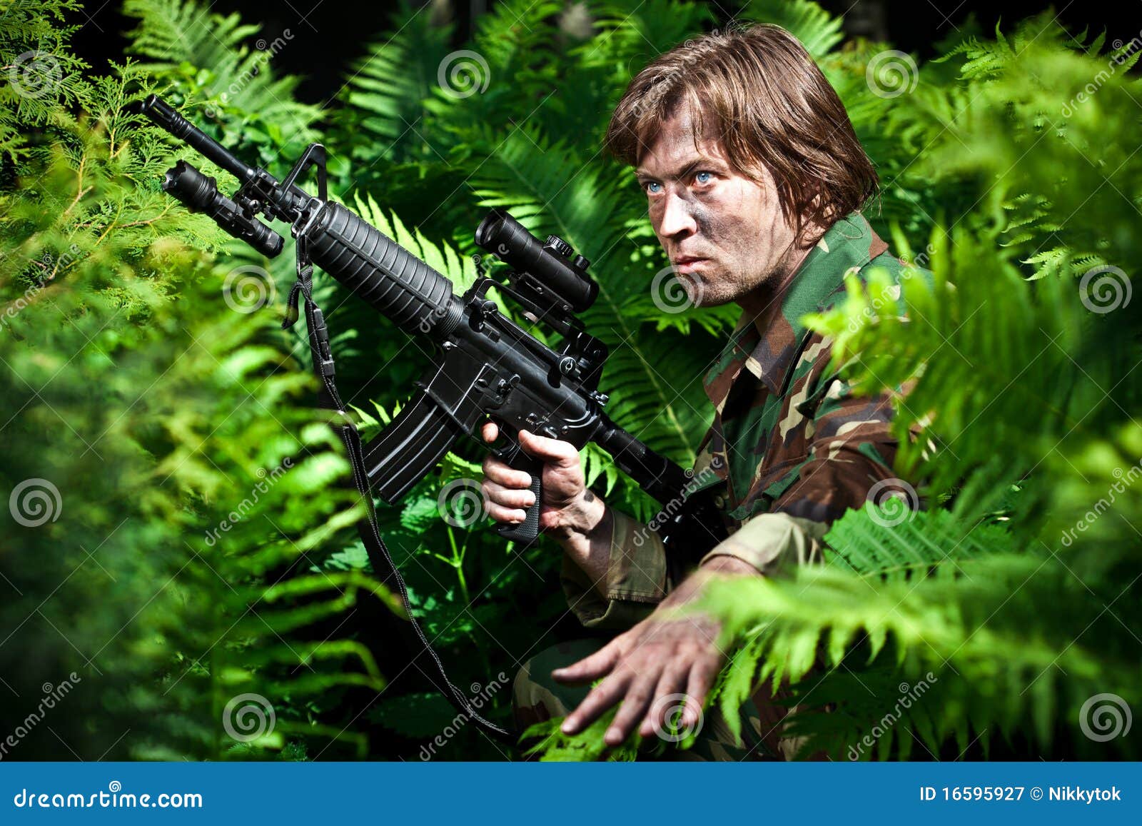 Soldier holding a gun stock image. Image of sniper, ambush - 16595927