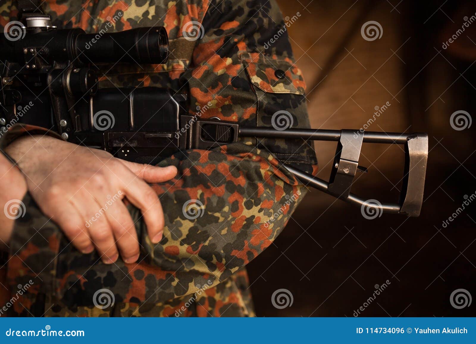 A Soldier is Holding a Gun in His Hands Stock Photo - Image of military ...