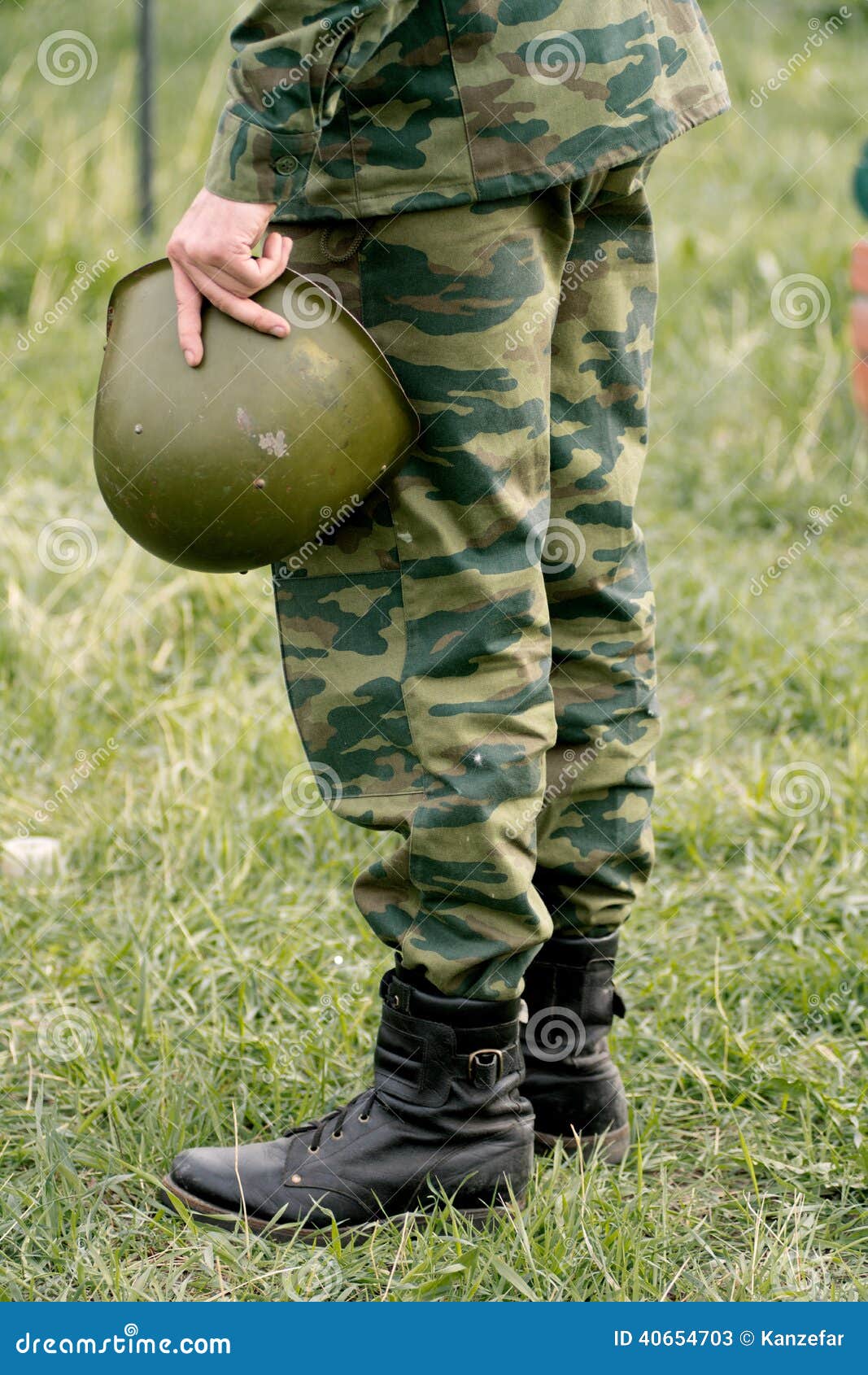 Soldier Holding a Helmet. End of Hostilities Stock Image - Image of ...