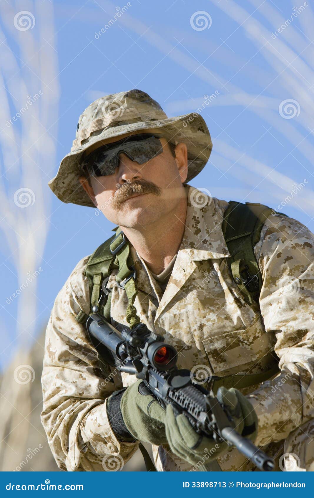 Soldier Holding Rifle Against Sky Stock Image - Image of male ...