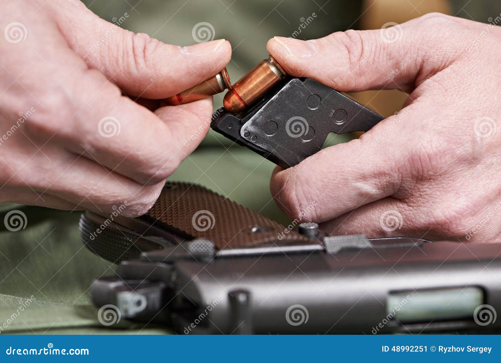 Soldier Load Ammo In Clip Colt Stock Image | CartoonDealer.com #48992251