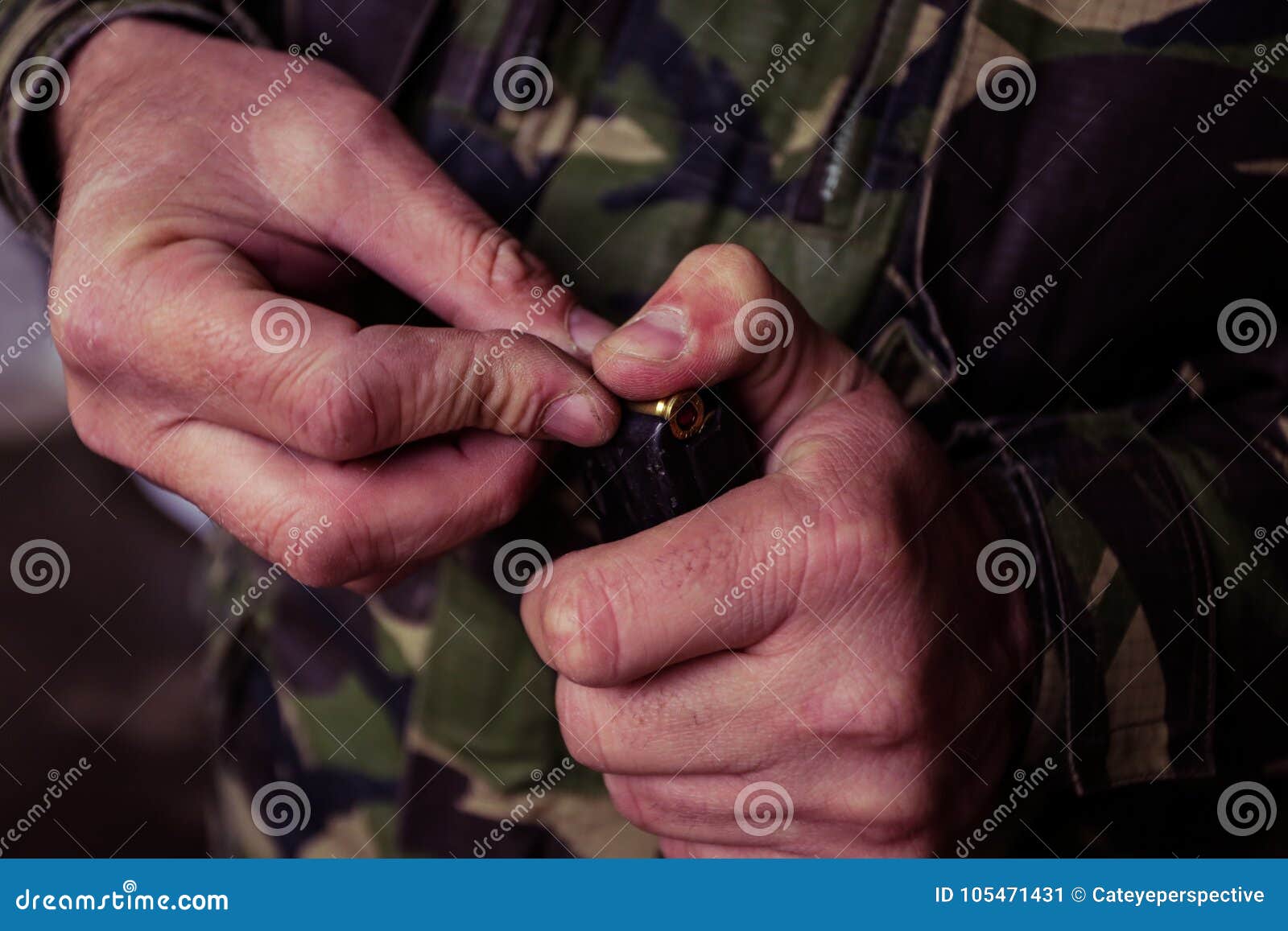 Soldier Loading a 9mm Caliber Cartridge Stock Image - Image of combat ...