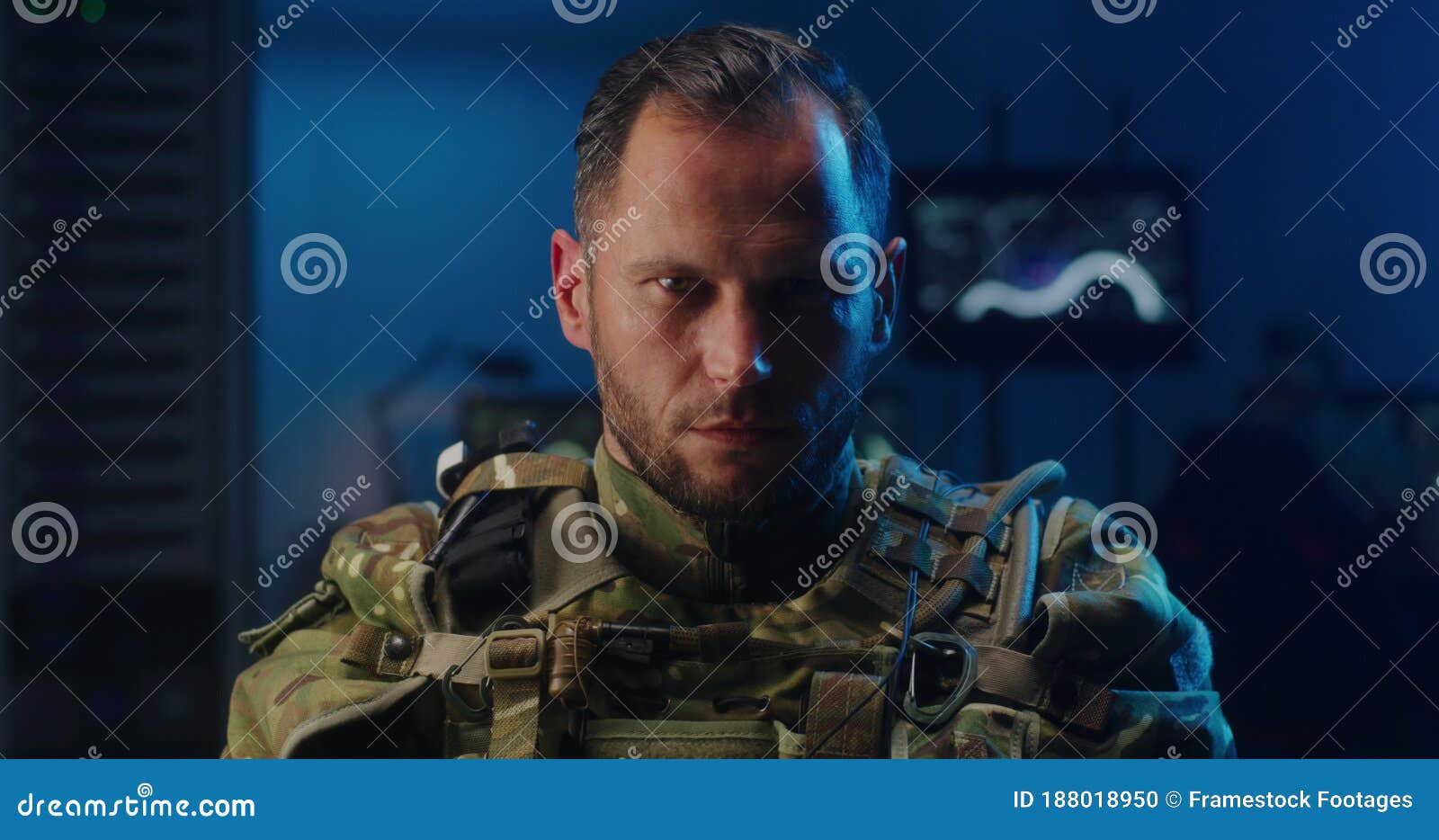 Soldier looking at camera stock footage. Video of serious - 188018950