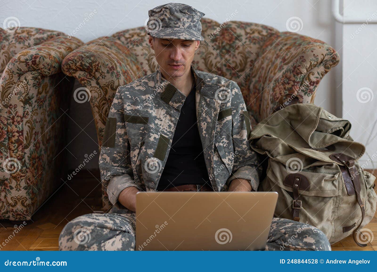 Soldier in Military Uniform Using High Tech Computer in Headquarters ...