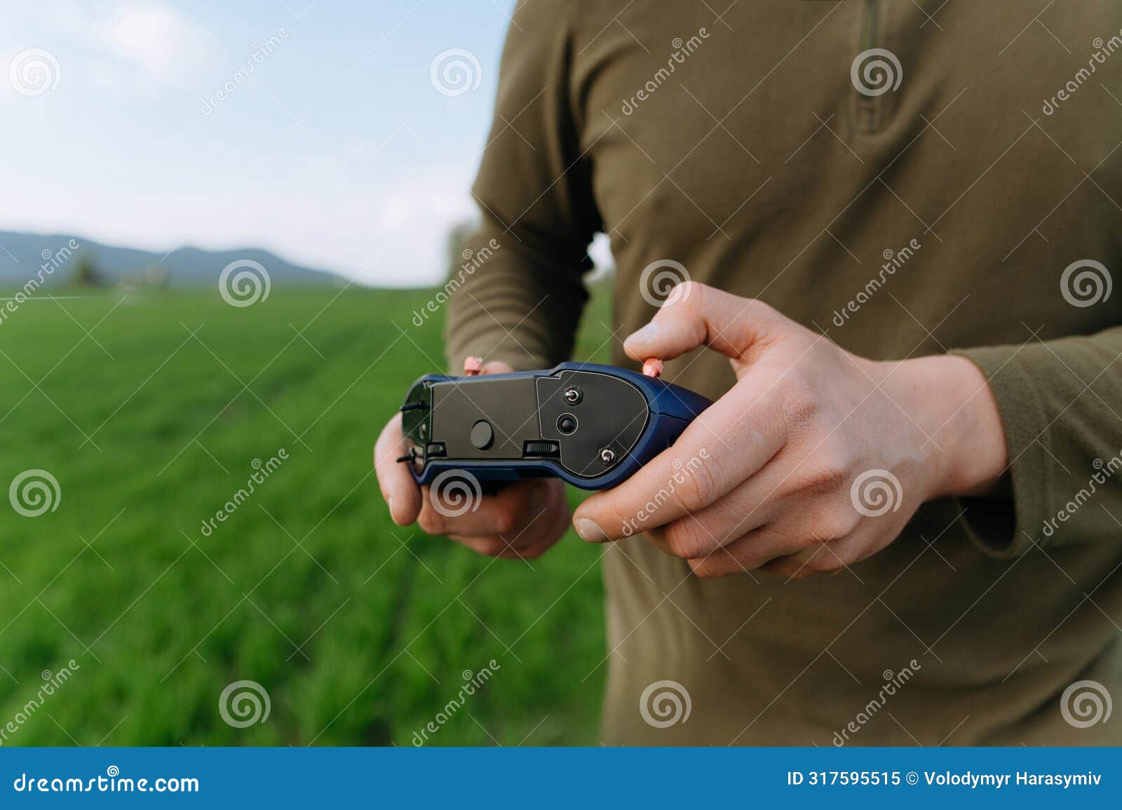 A Soldier Remote Controls a Drone. Control Panel in Hand Stock Image ...