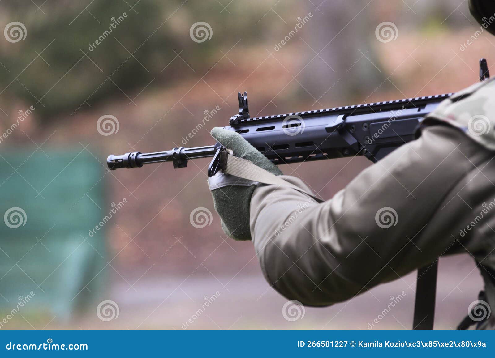 A Soldier with a Rifle in His Hand in the Field during the Fight Stock ...