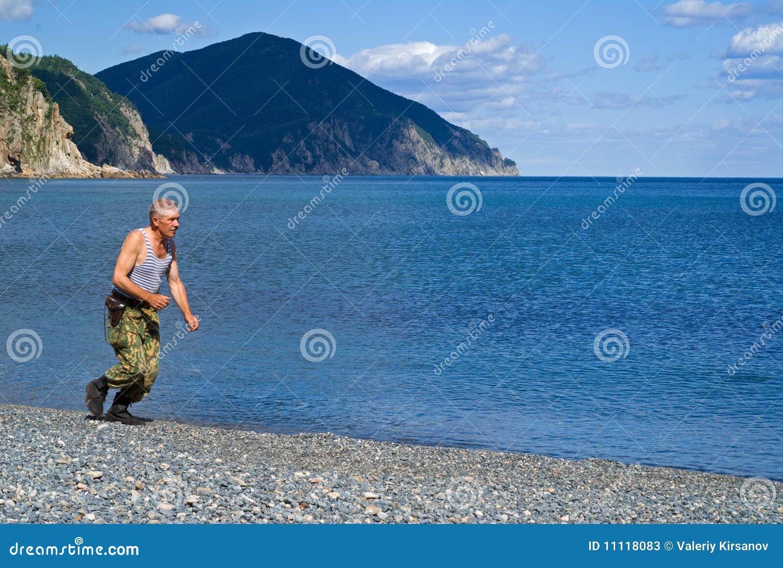 Soldier runs at sea 2 stock image. Image of blue, people - 11118083