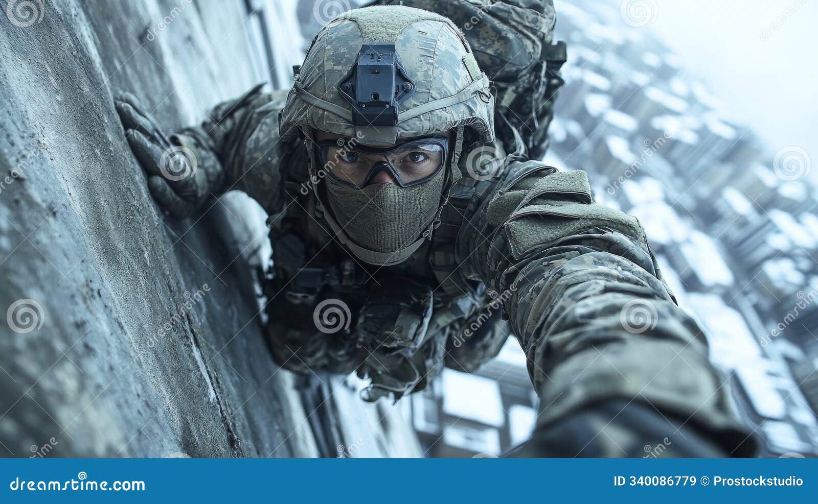 Soldier Scaling a Vertical Structure in a Mountainous Terrain during a ...