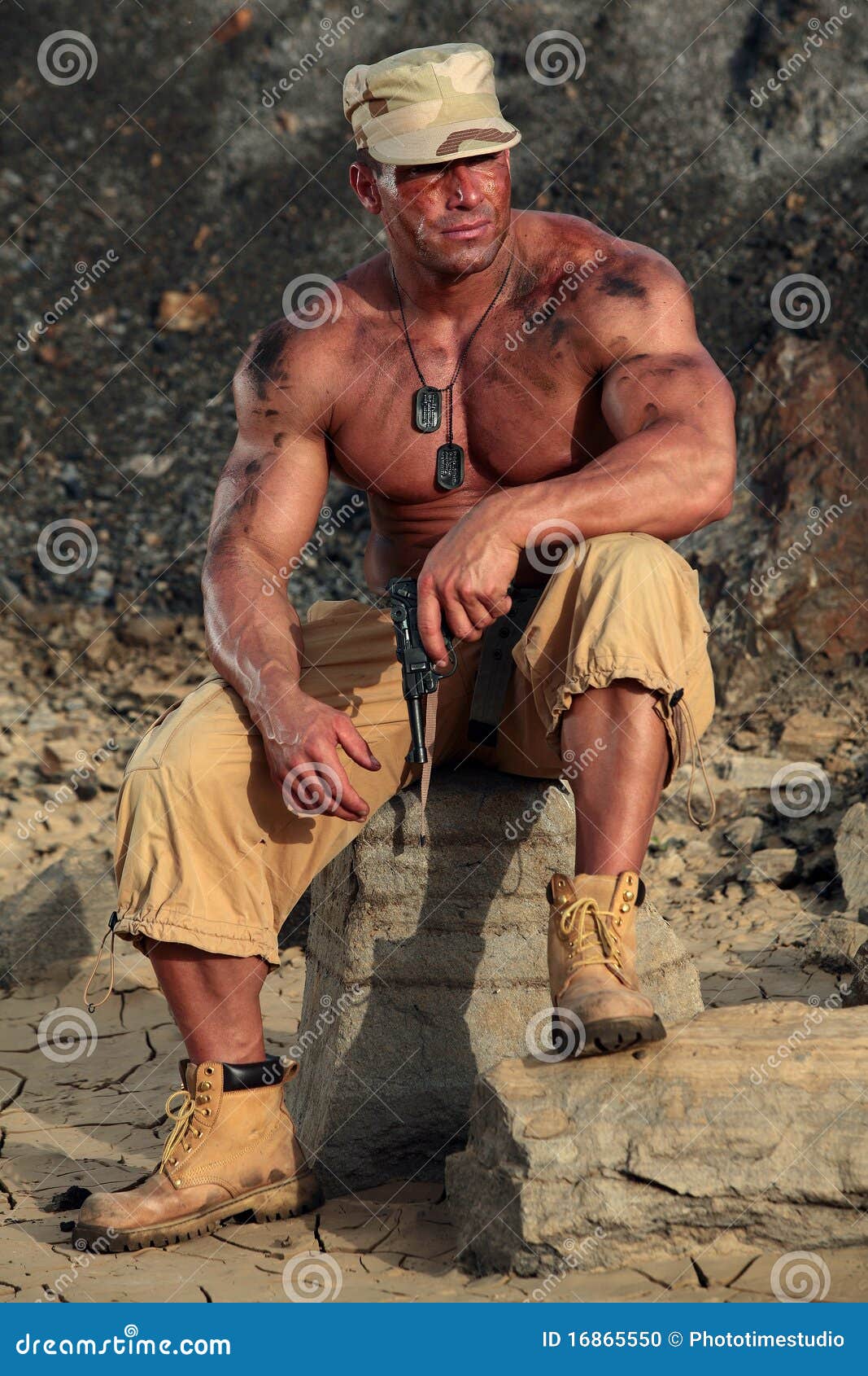 Soldier Sitting in Gravel Pit Stock Photo - Image of america, male ...