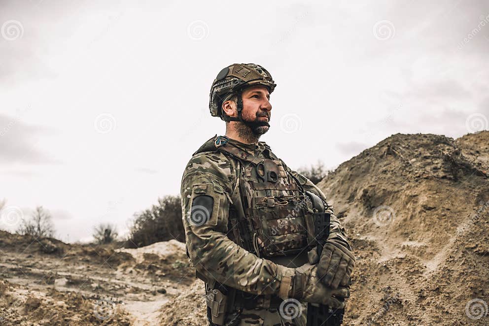 A Soldier Standing in a Dig-position Stock Photo - Image of warrior ...