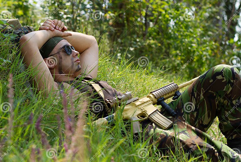 Soldier is Taking a Rest when the Battle is Over Stock Photo - Image of ...