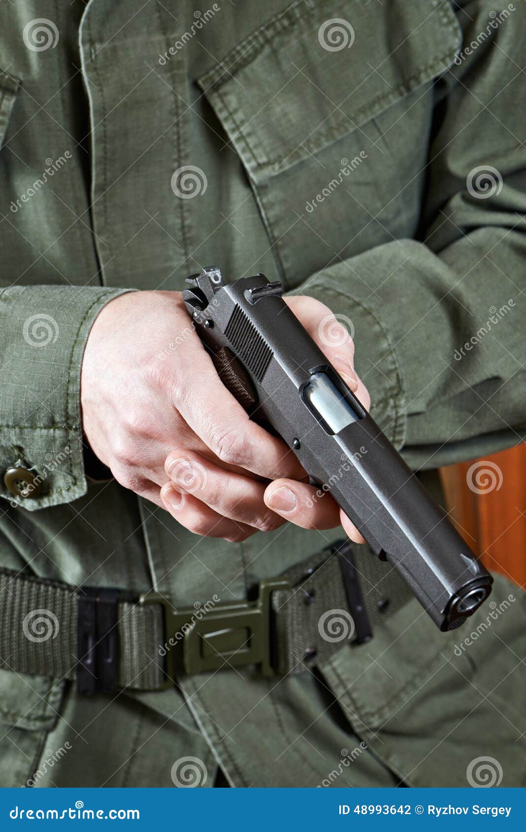 Soldier in Uniform Holding Gun Stock Photo - Image of ammunition ...