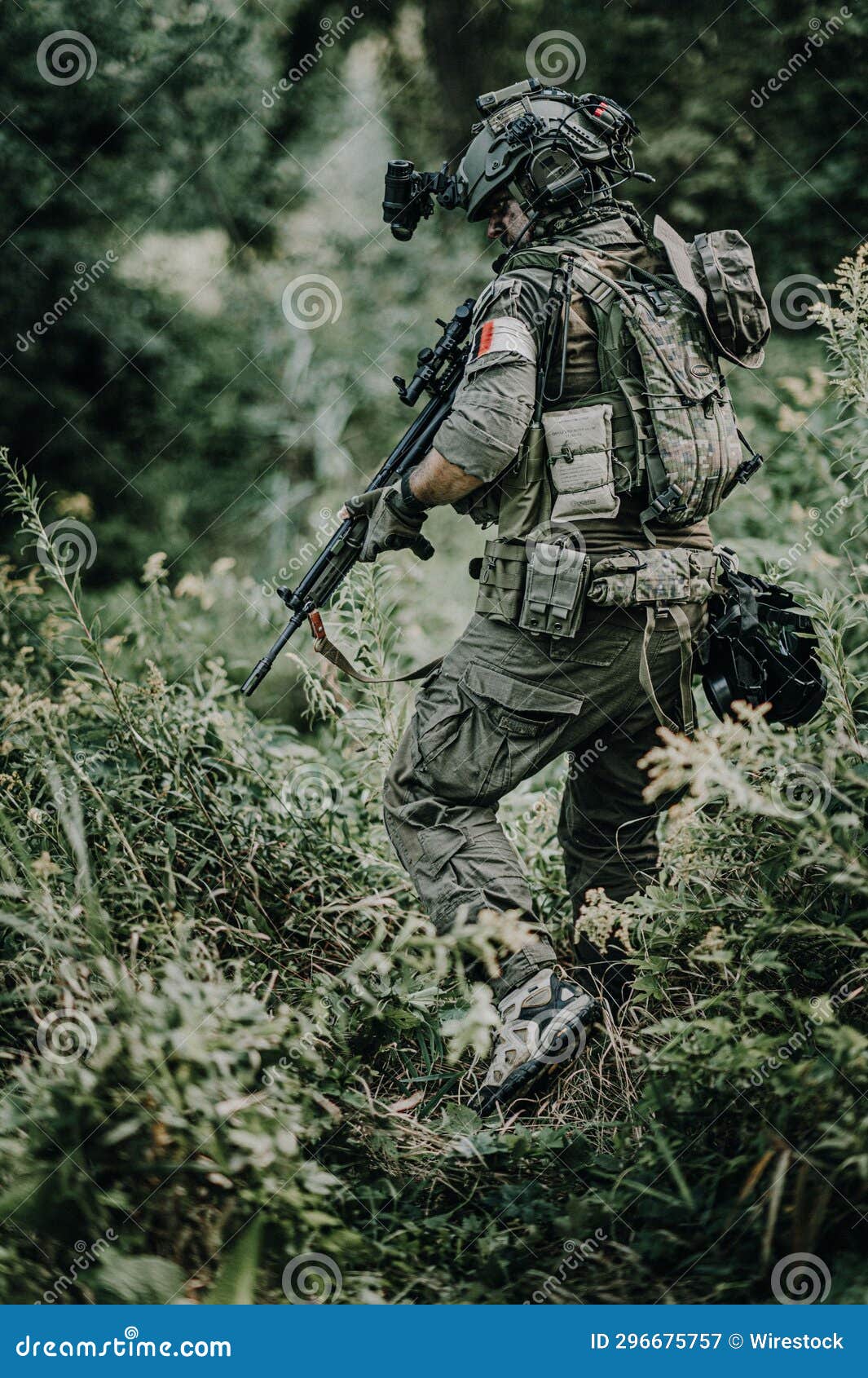 Soldier in Uniform Standing in the Middle of a Green Forest Editorial ...