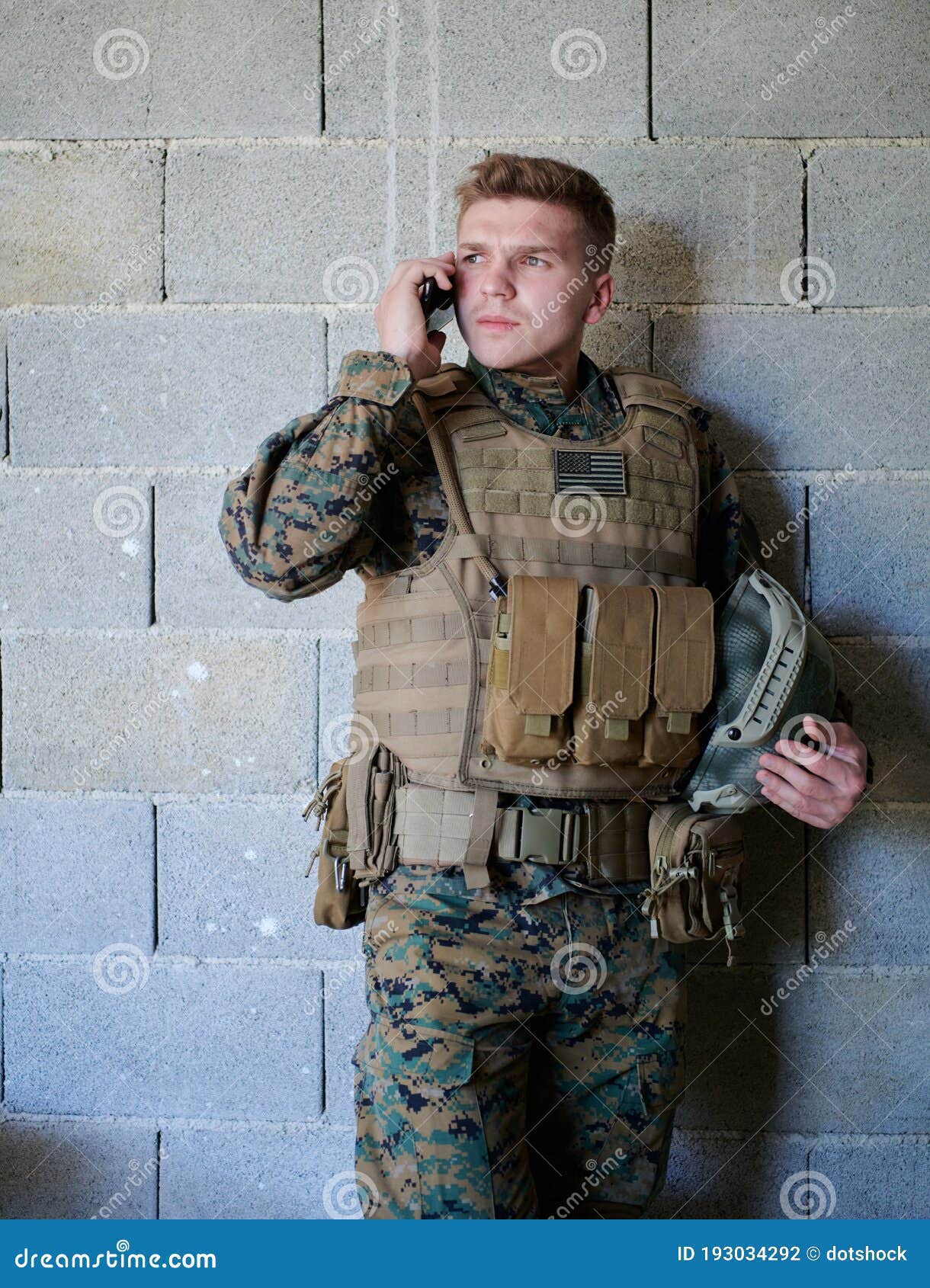 Soldier using smartphone stock photo. Image of camouflage - 193034292