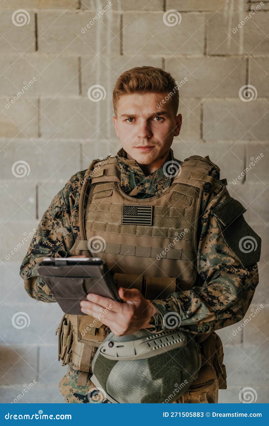 Soldier Using Tablet Computer Against Old Brick Wall Stock Image ...