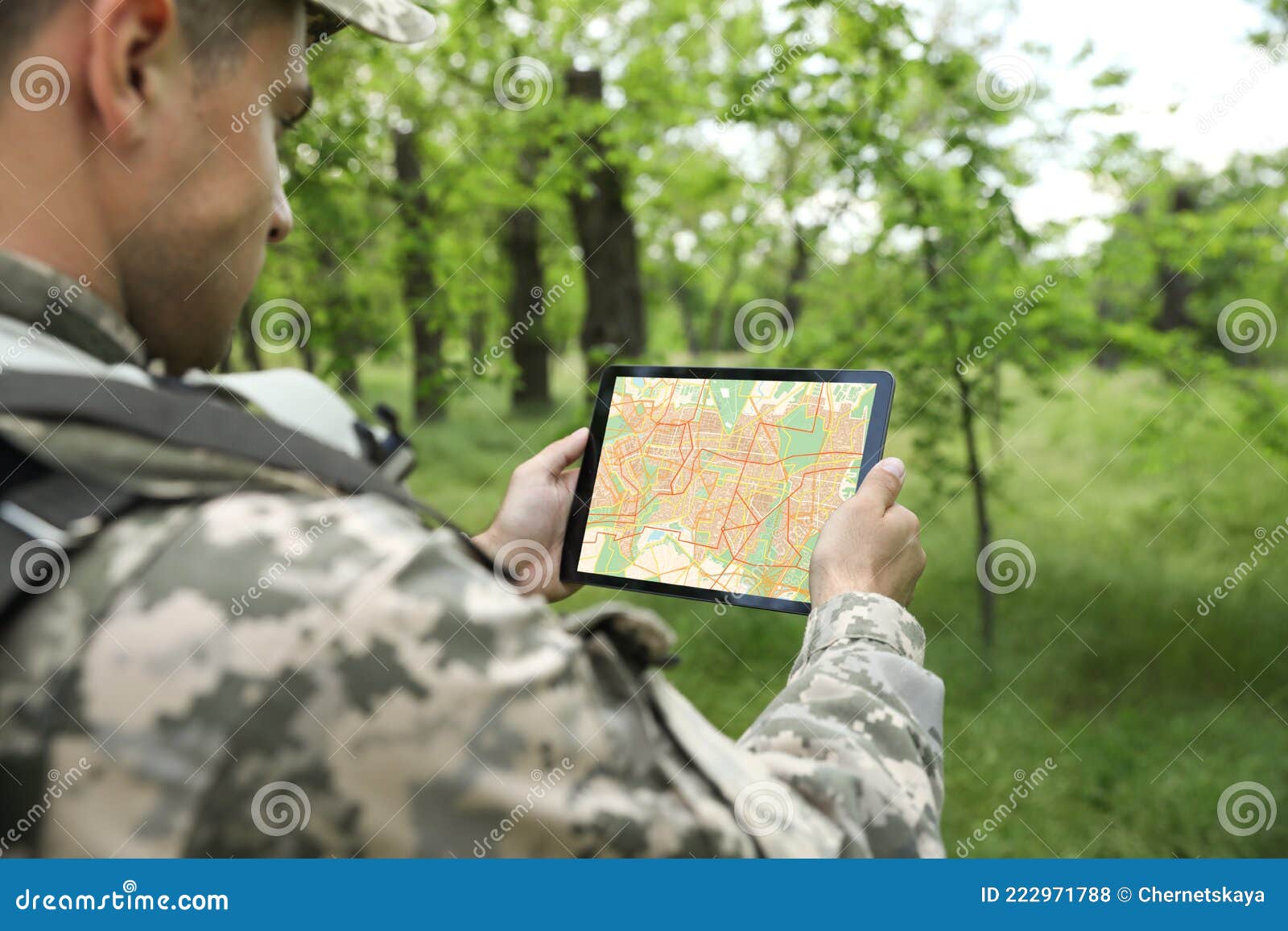 Soldier Using Tablet in Forest. Modern Stock Photo - Image of military ...