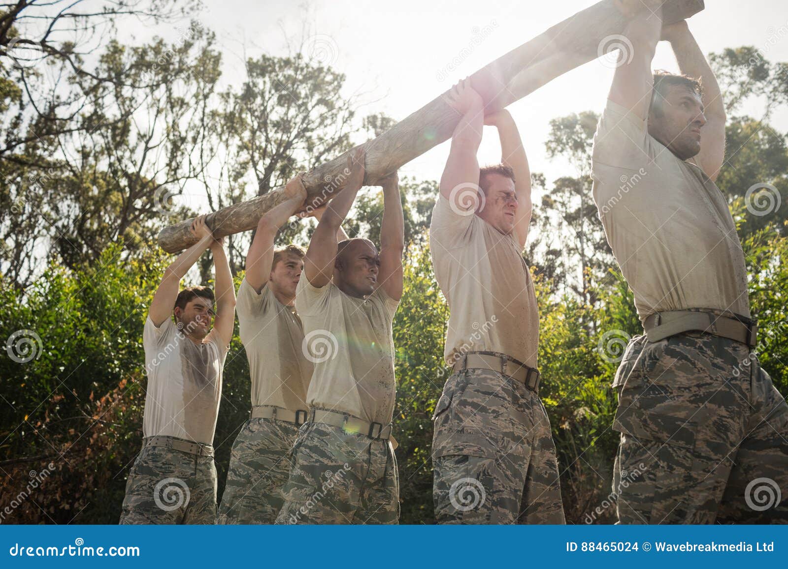 Soldiers Carrying a Tree Log Stock Photo - Image of boot, power: 88465024