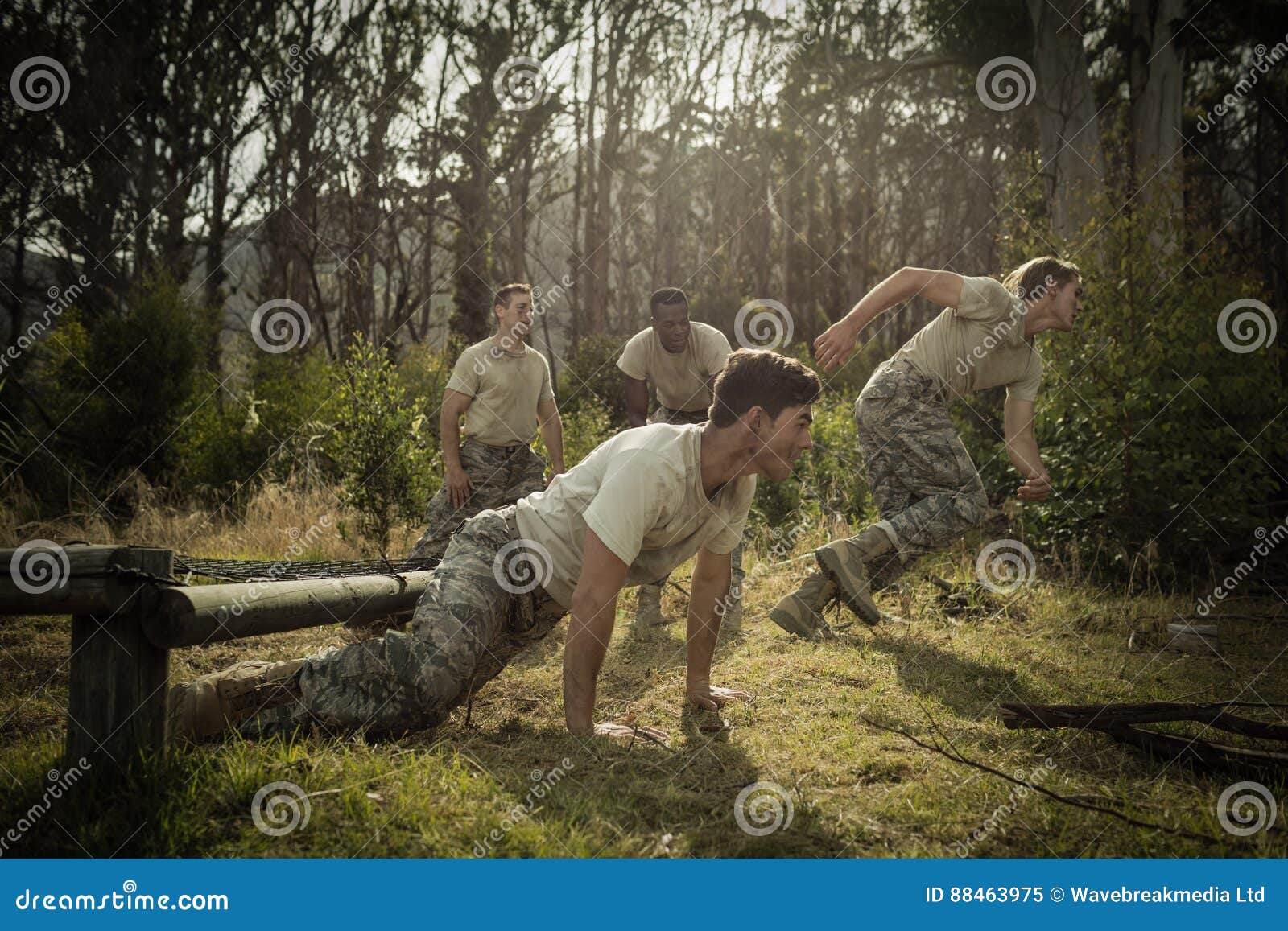 Soldiers Crawling Under the Net during Obstacle Course Stock Image ...