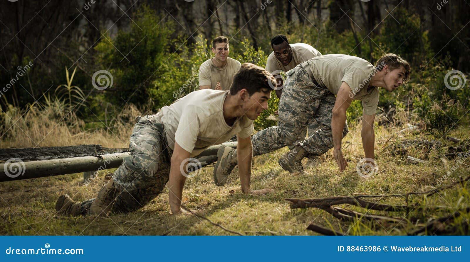 Soldiers Crawling Under the Net during Obstacle Course Stock Photo ...