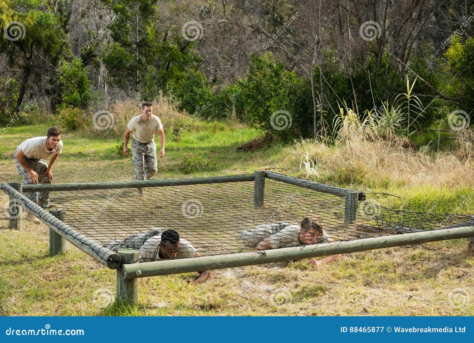 Soldiers Crawling Under the Net during Obstacle Course Stock Image ...