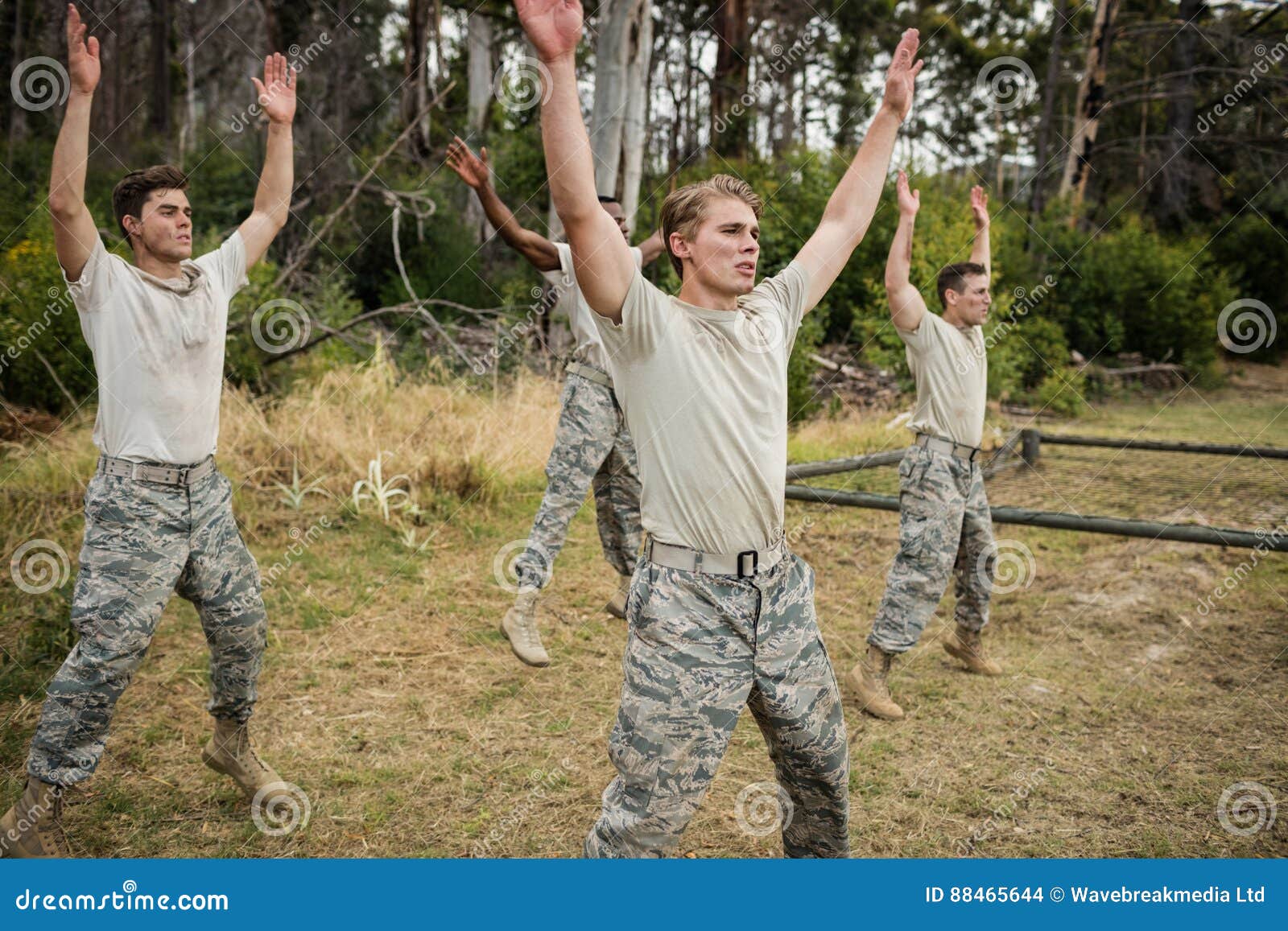 Soldiers Performing Stretching Exercise Stock Photo - Image of power ...