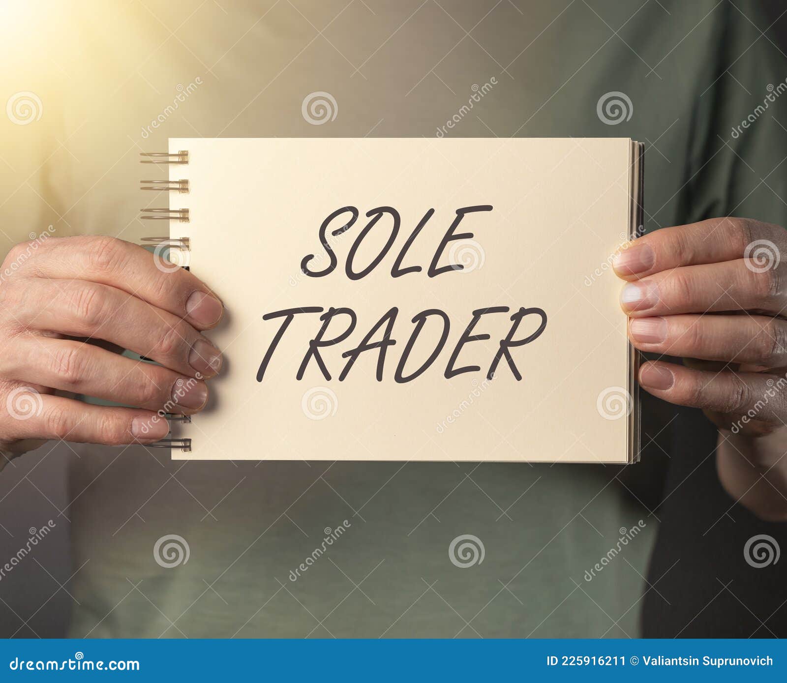SOLE TRADER TEXT on NOTE in HAND of MAN Stock Image - Image of company ...