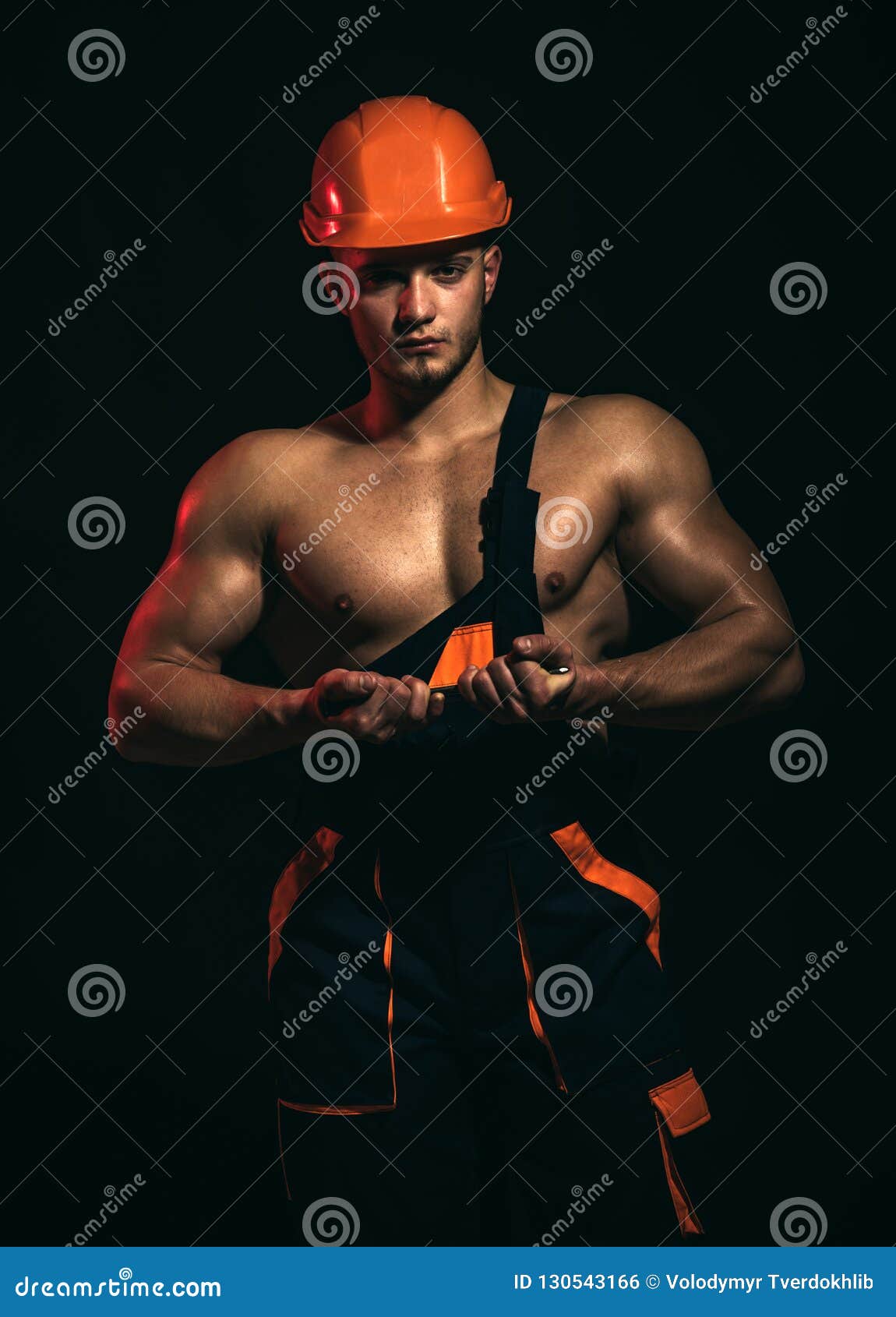 We are Solid As Steel. Worker or Workman in Hard Hat. Muscular Man Bend ...