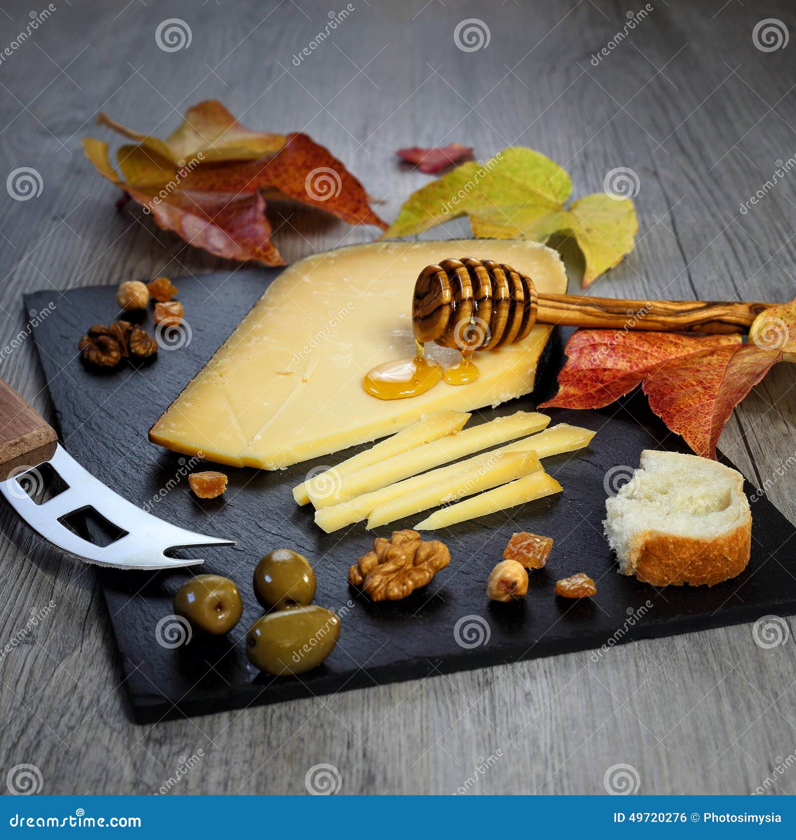 Solid Cheeses Plate: Dutch Solid Cheese, Olives and Walnuts Stock Photo ...