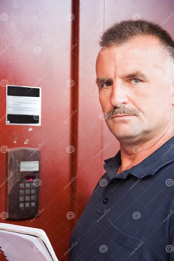 Solid men and intercom stock image. Image of alarm, repairman - 67668053