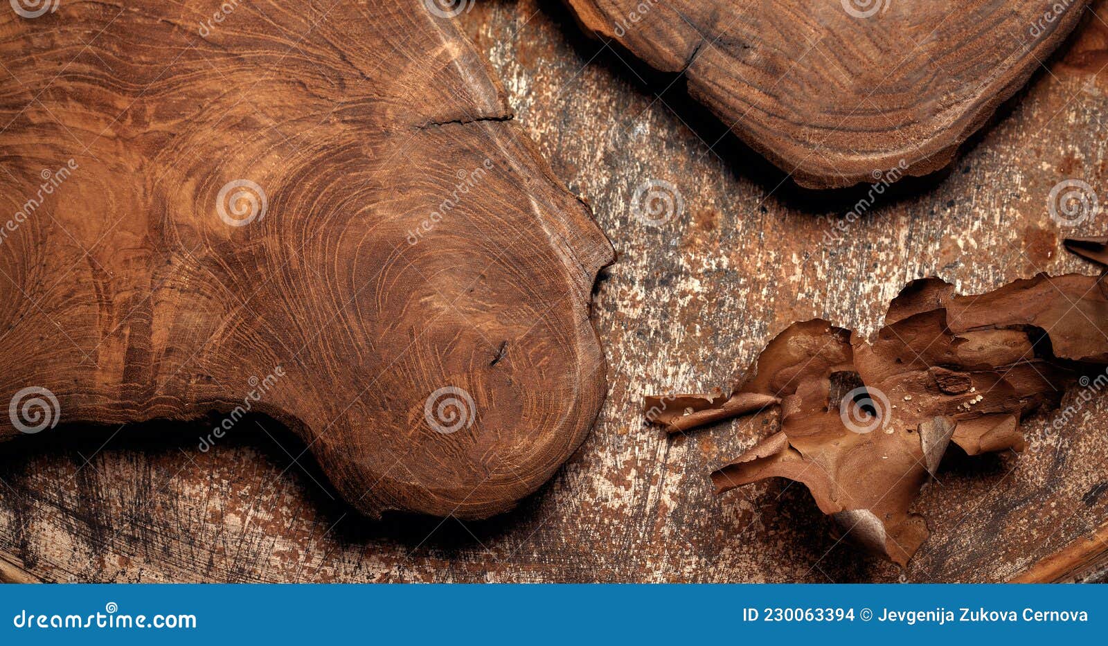 Solid Oak Cutting Board and Pine Tree Bark on Rust Metal Background ...