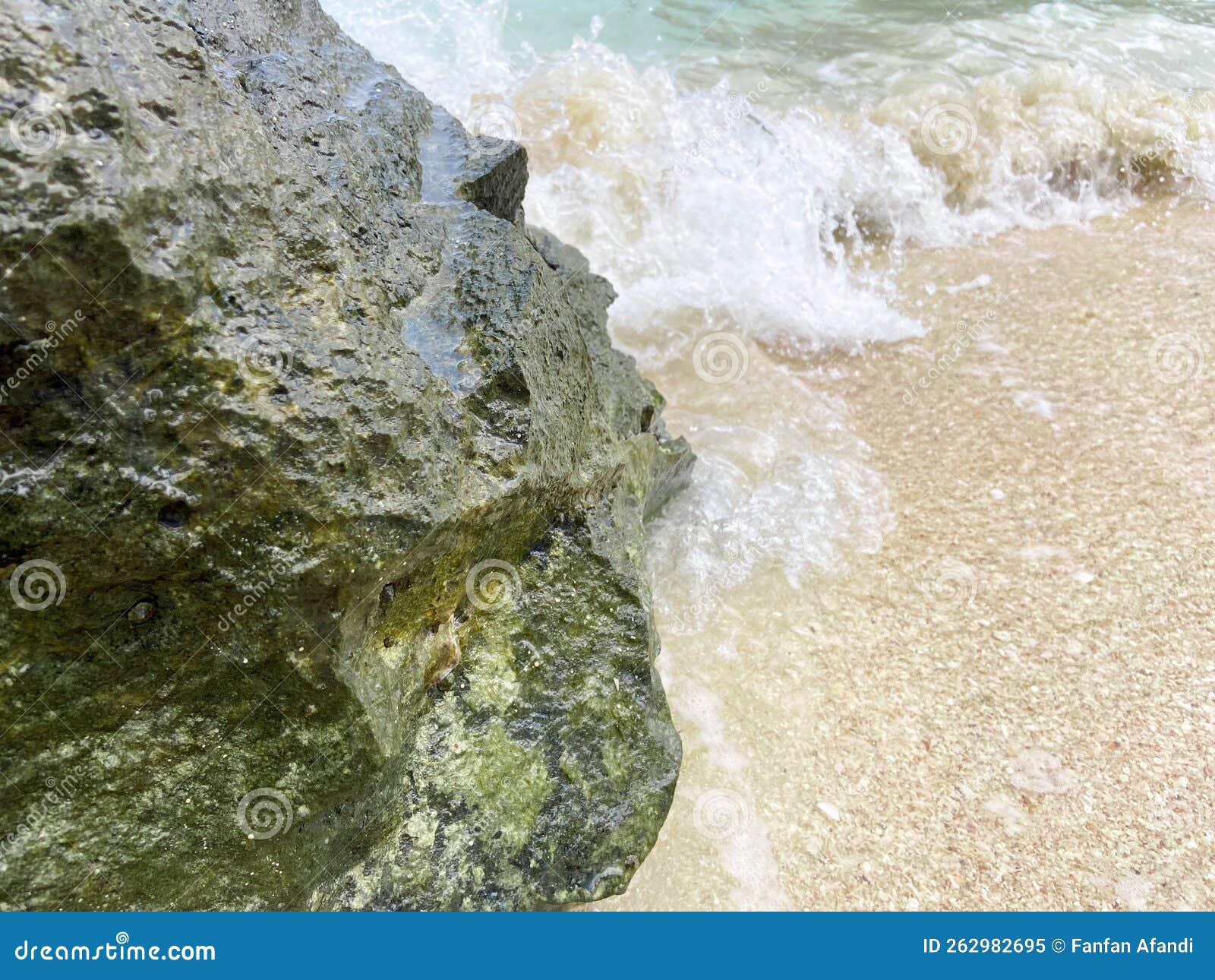 Solid Rock on the Beach stock image. Image of beach - 262982695