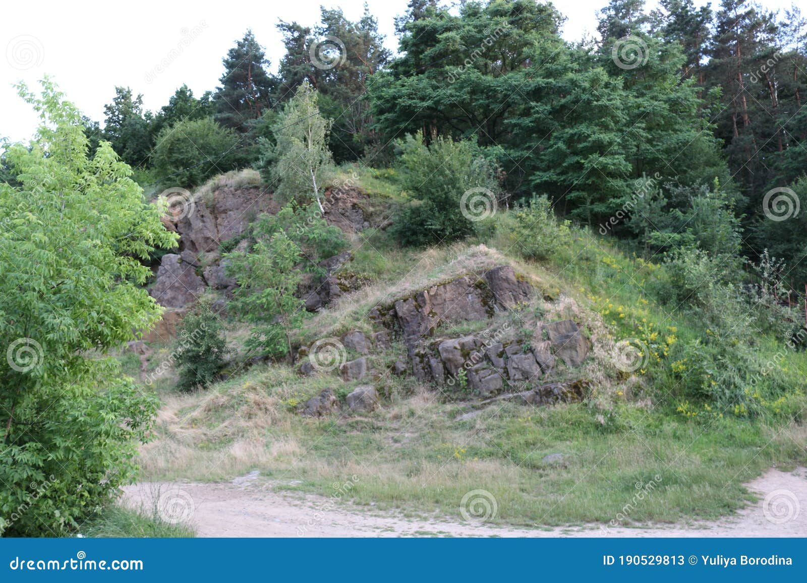 Solid Rocks Come To the Surface on a Steep River Bank Stock Image ...