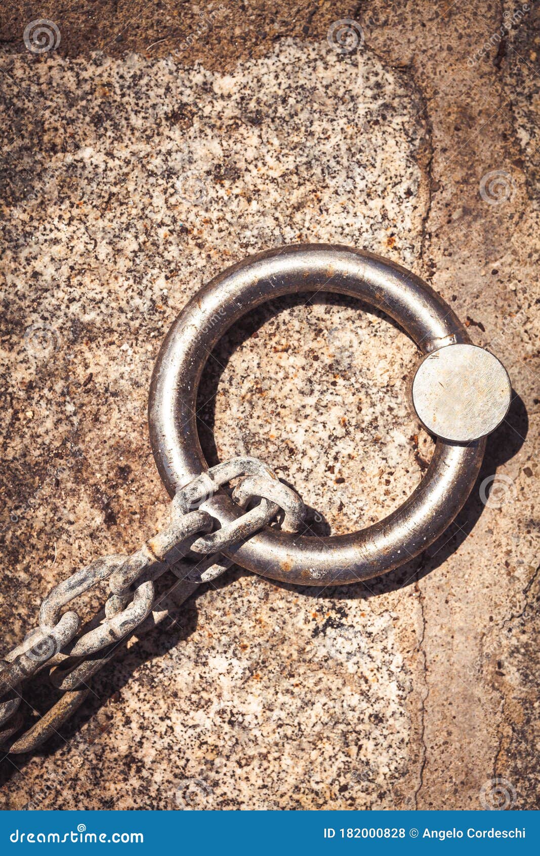 Solid Steel Ring and Mooring Lines in a Seaport. Rusty Iron Chain on ...