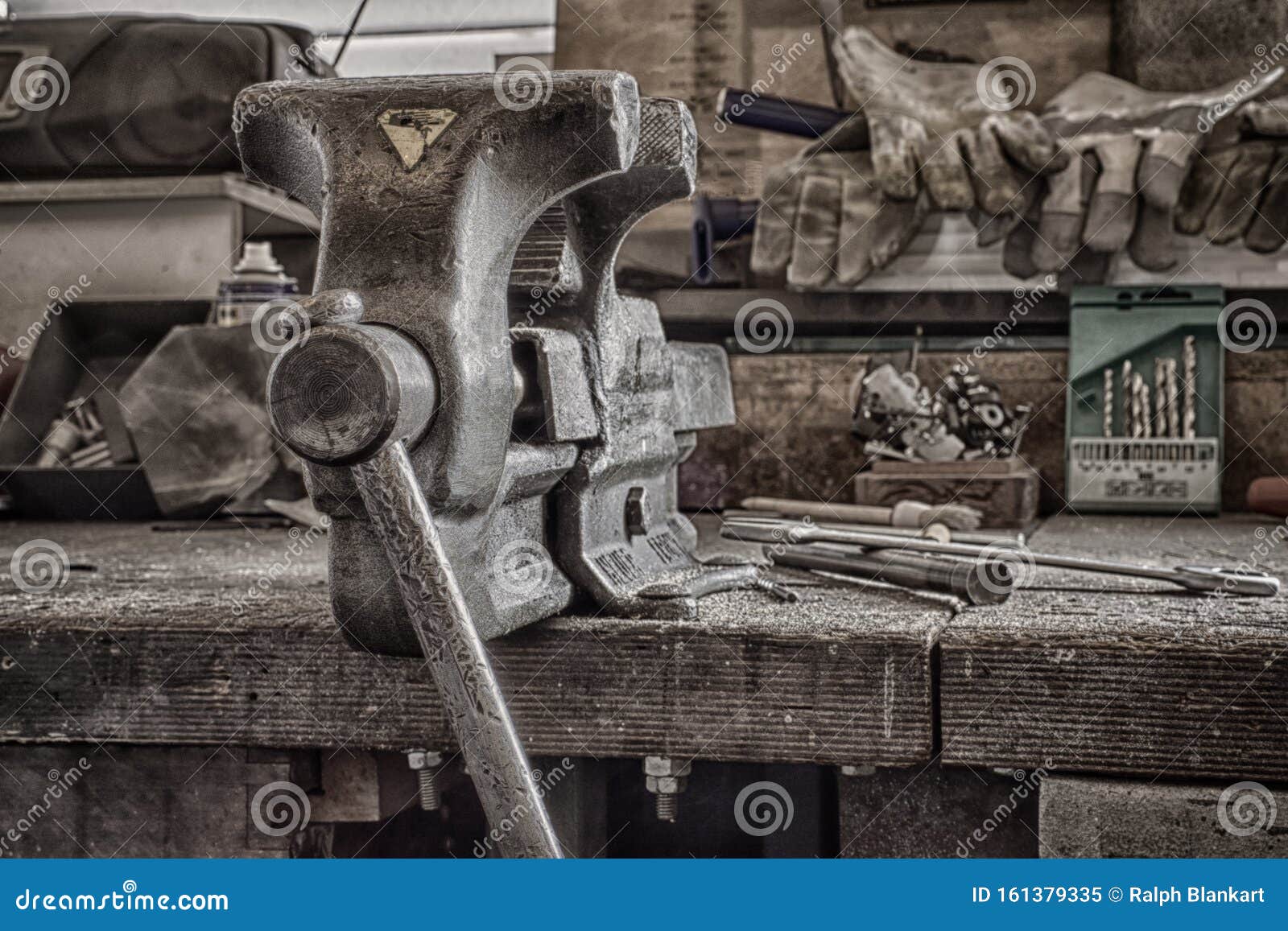 Solid Tabletop Vise on a Messy Workbench. Stock Image - Image of ...