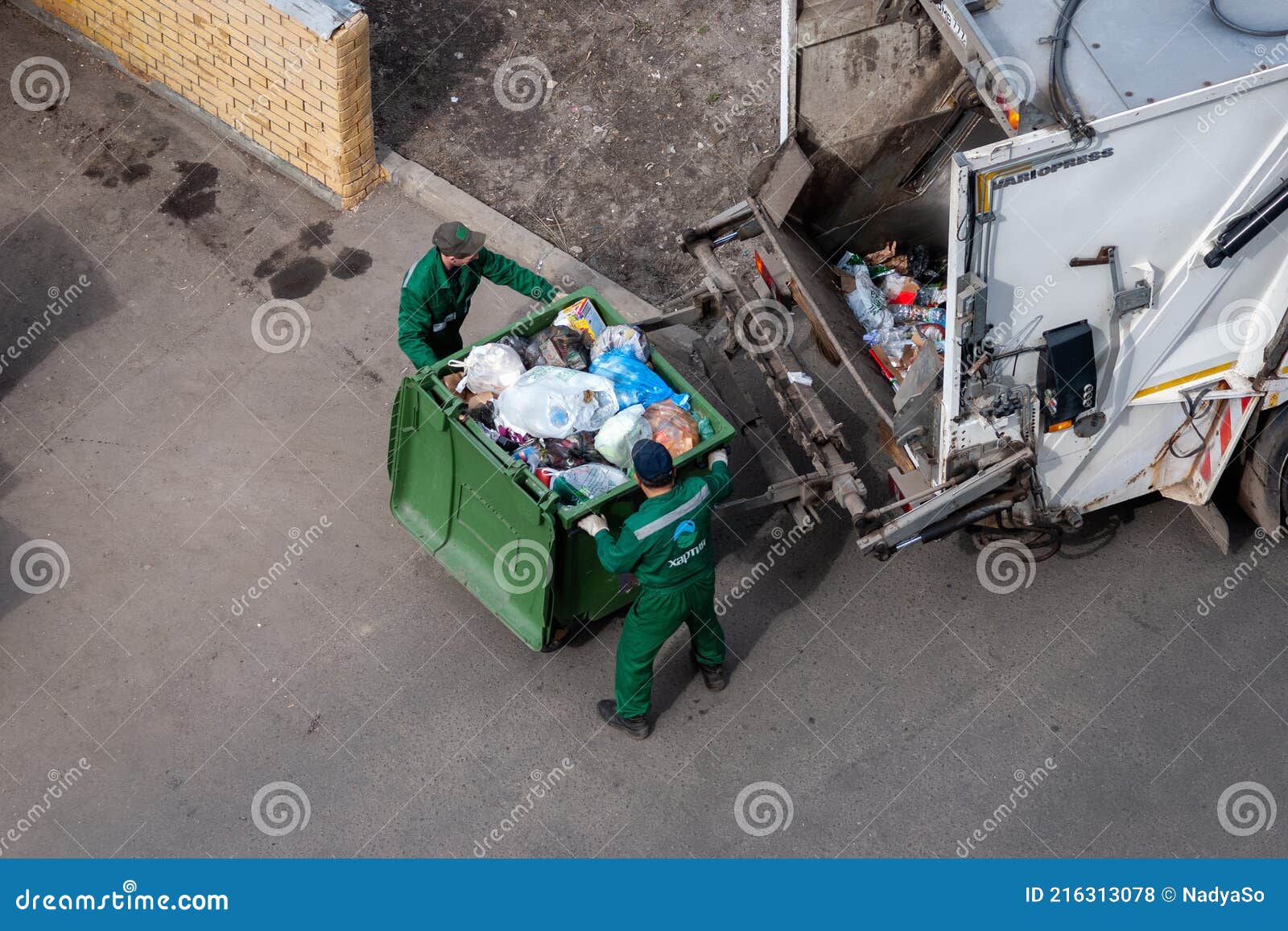 Solid Waste Collection Workers Loading Garbage Truck Editorial Stock ...