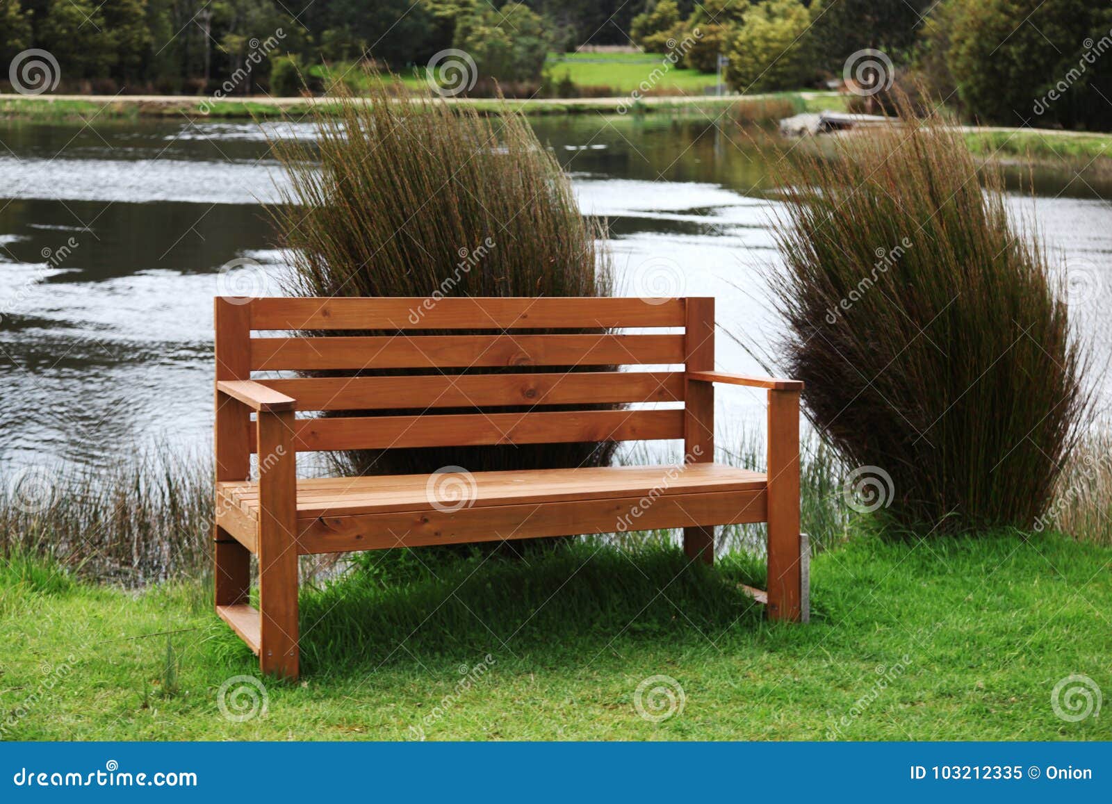 Park Bench by the Riverside Stock Image - Image of light, bench: 103212335