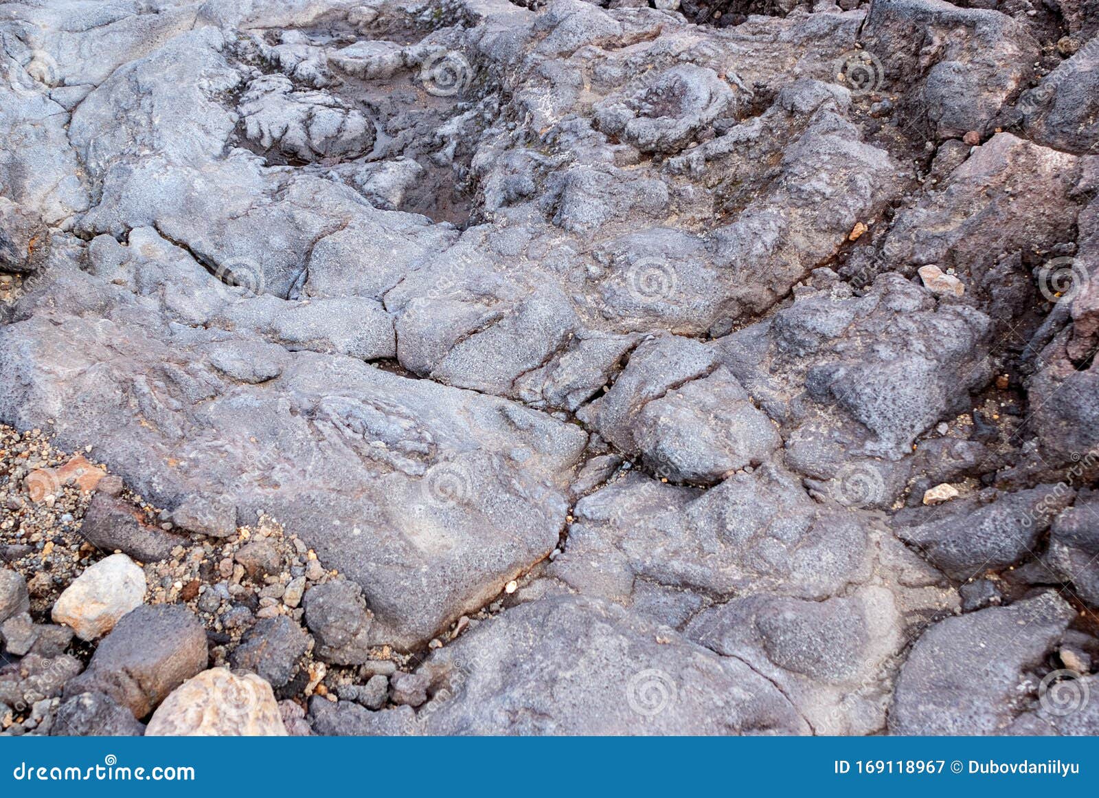 The Base Of The Rock Is Covered With A Thick Layer Of Bizarre Icicles ...