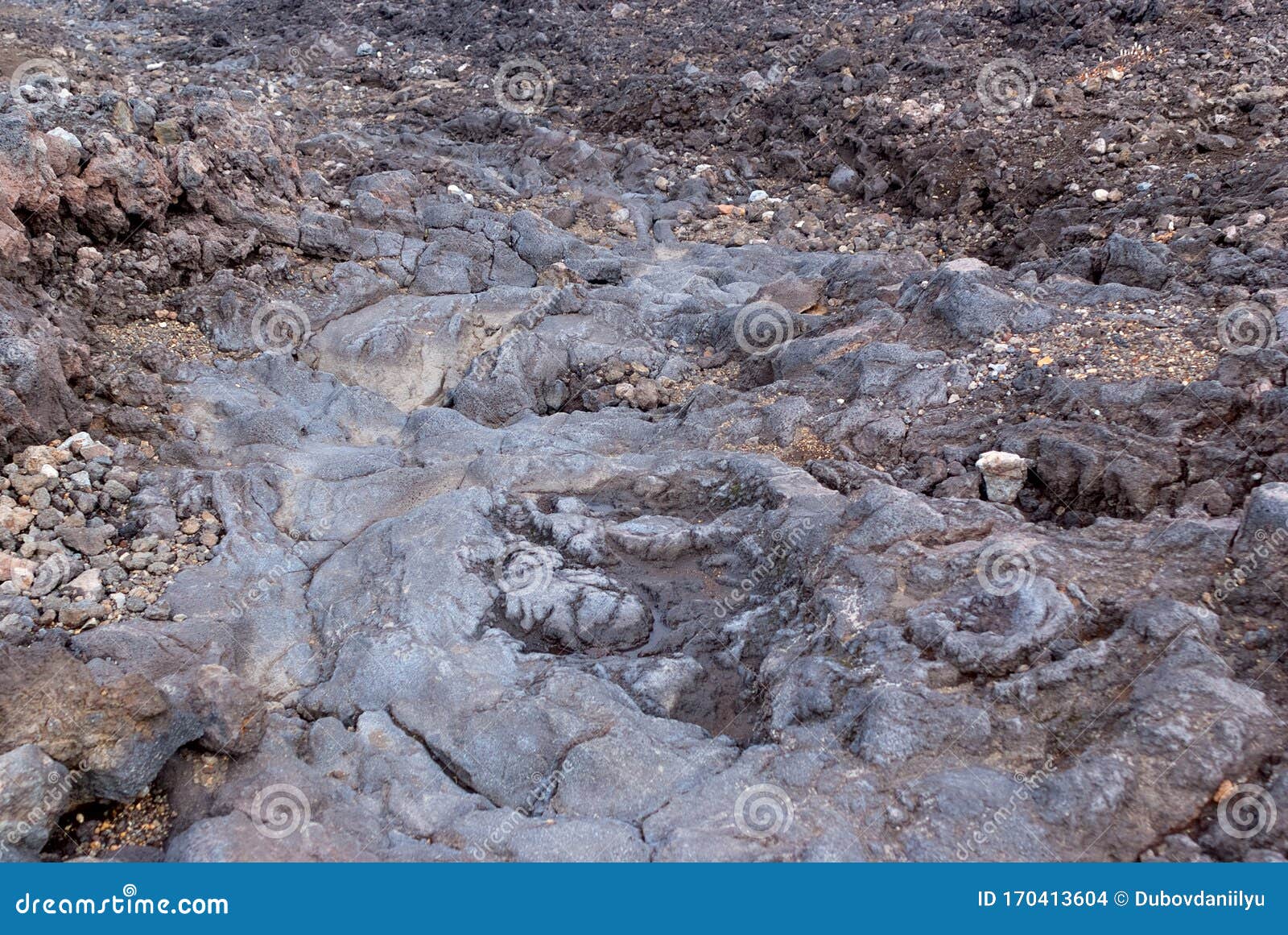 The Base Of The Rock Is Covered With A Thick Layer Of Bizarre Icicles ...