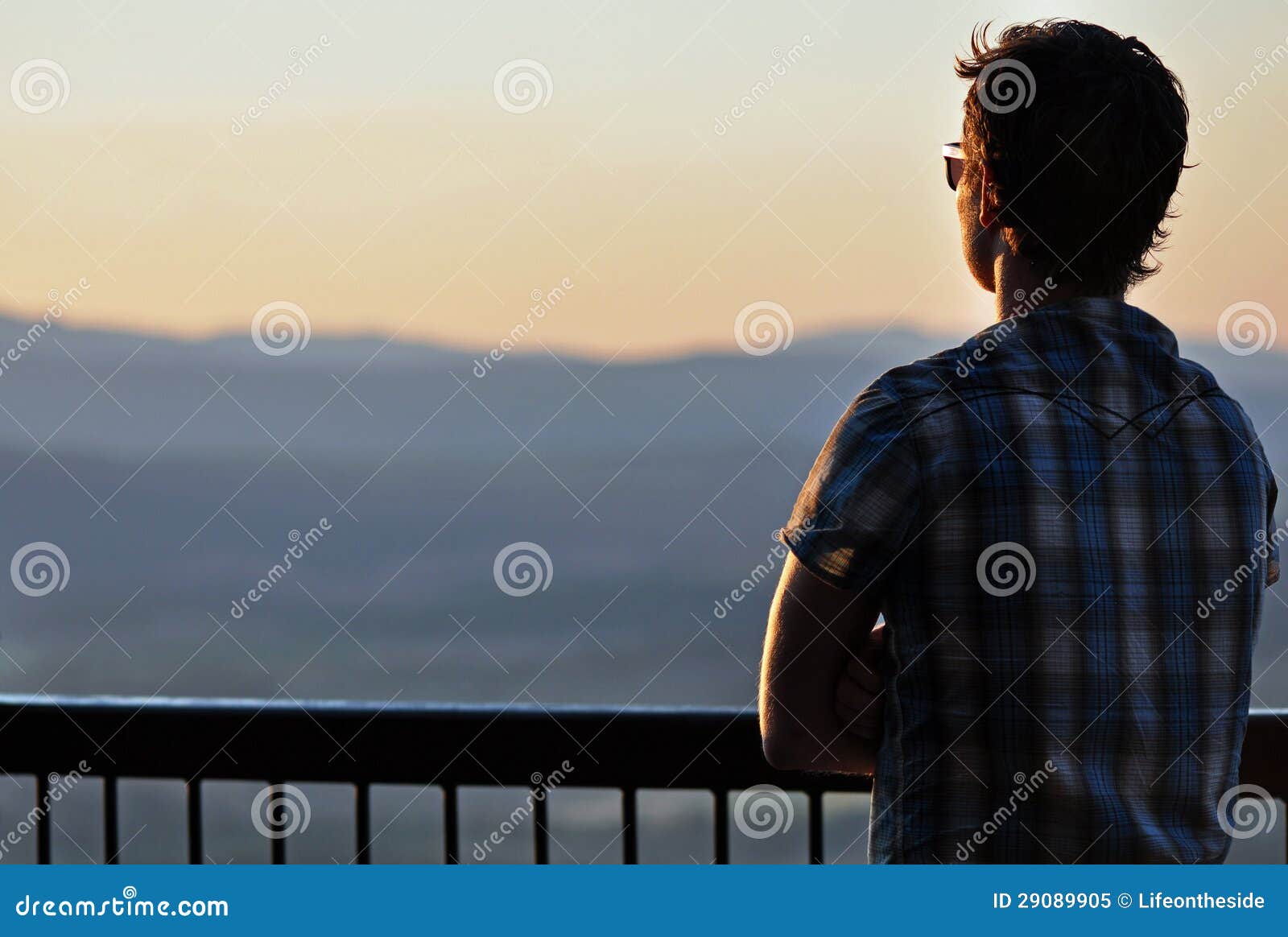 Solitude - Young Man Gazing Over Mountains Stock Image - Image of ...