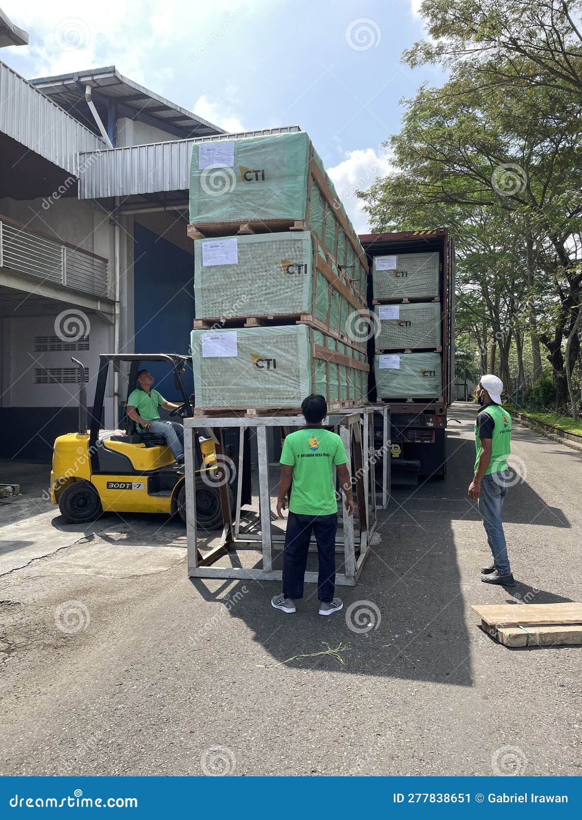 The Process of Loading Goods into Containers. Editorial Photo - Image ...