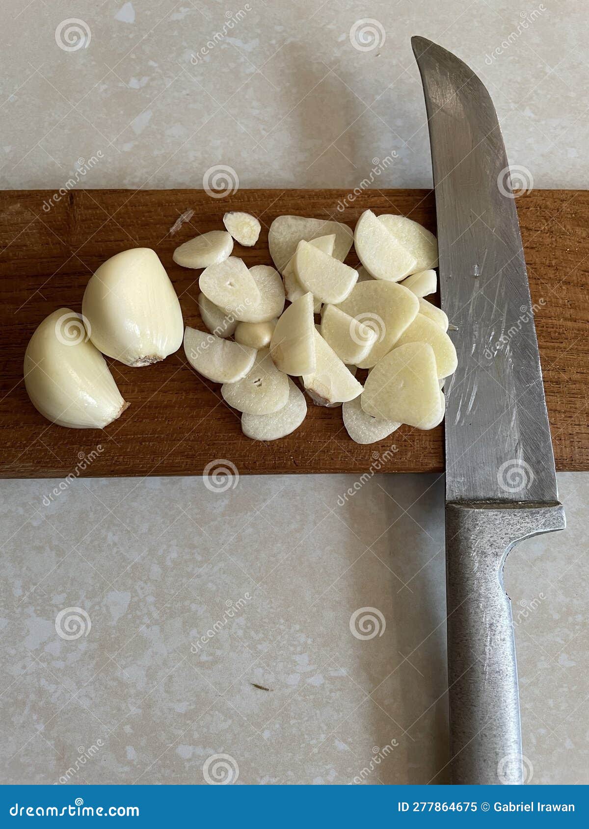 Sliced Garlic on a Cutting Board. Stock Image - Image of background ...