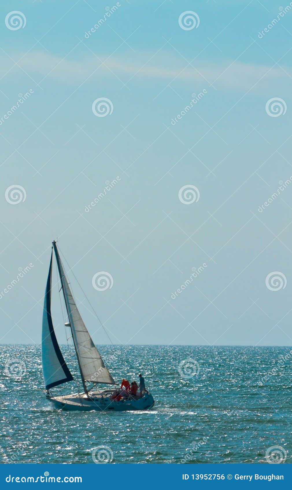 Solo Sailboat on Ocean stock photo. Image of blue, sails - 13952756