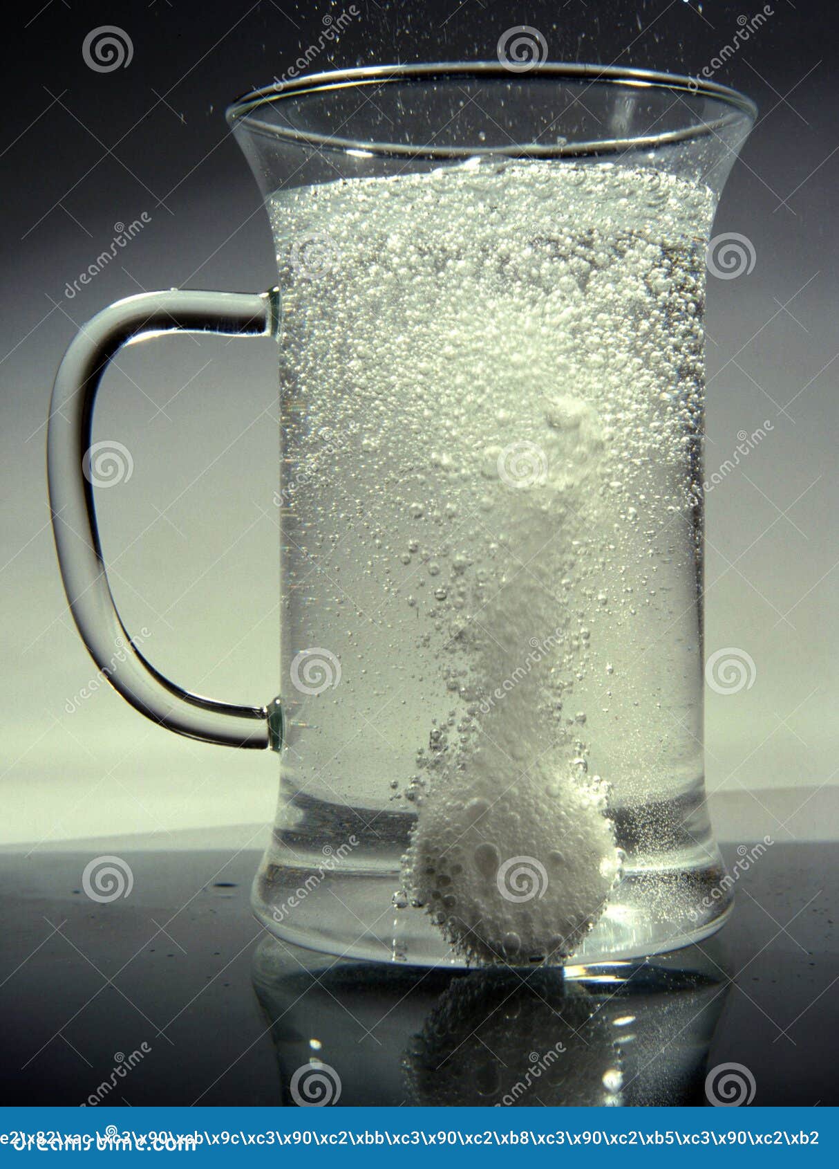 Soluble tablet in a glass stock image. Image of tablet - 82877191